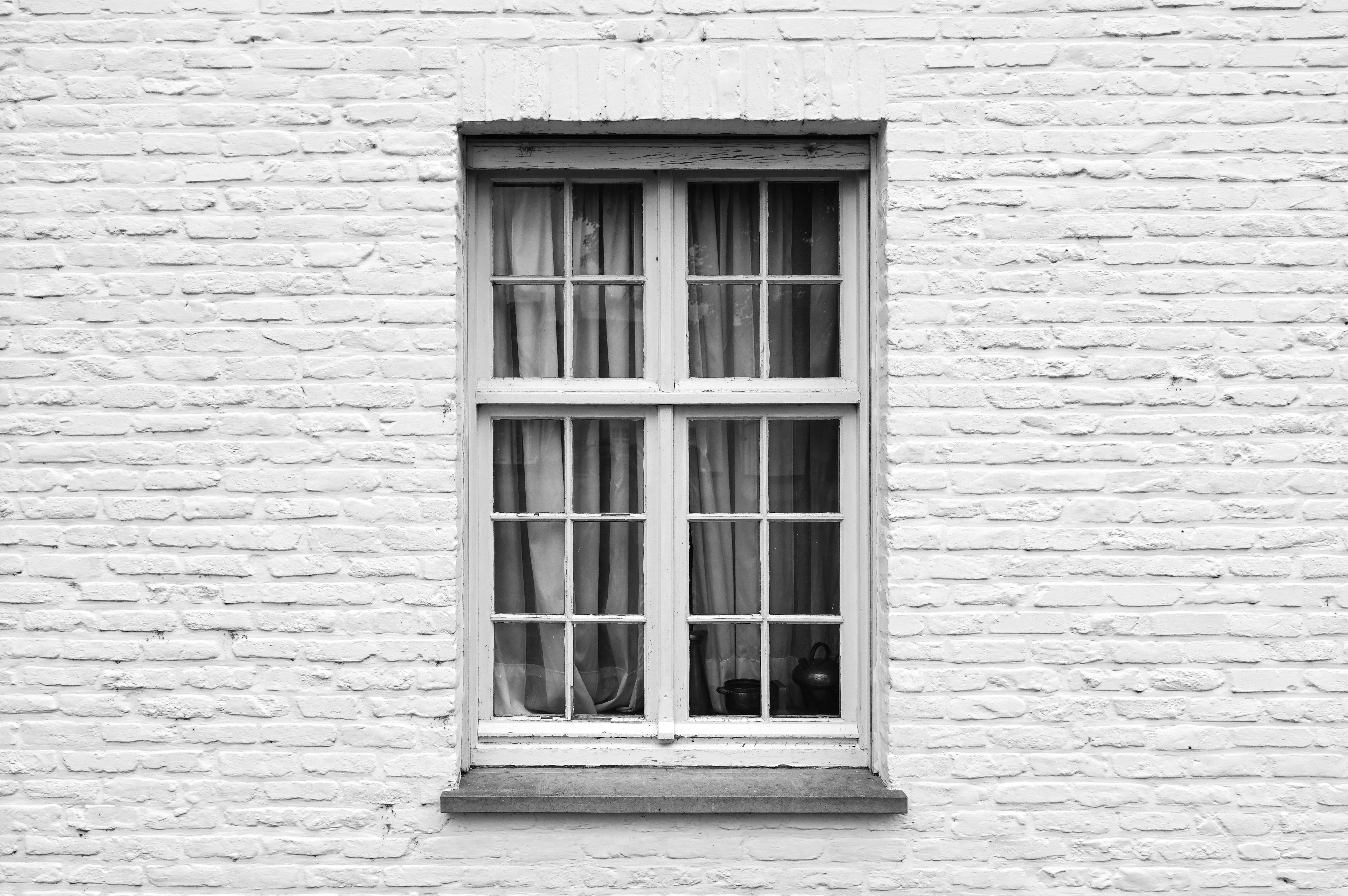 Glass Window on Brick Wall · Free Stock Photo