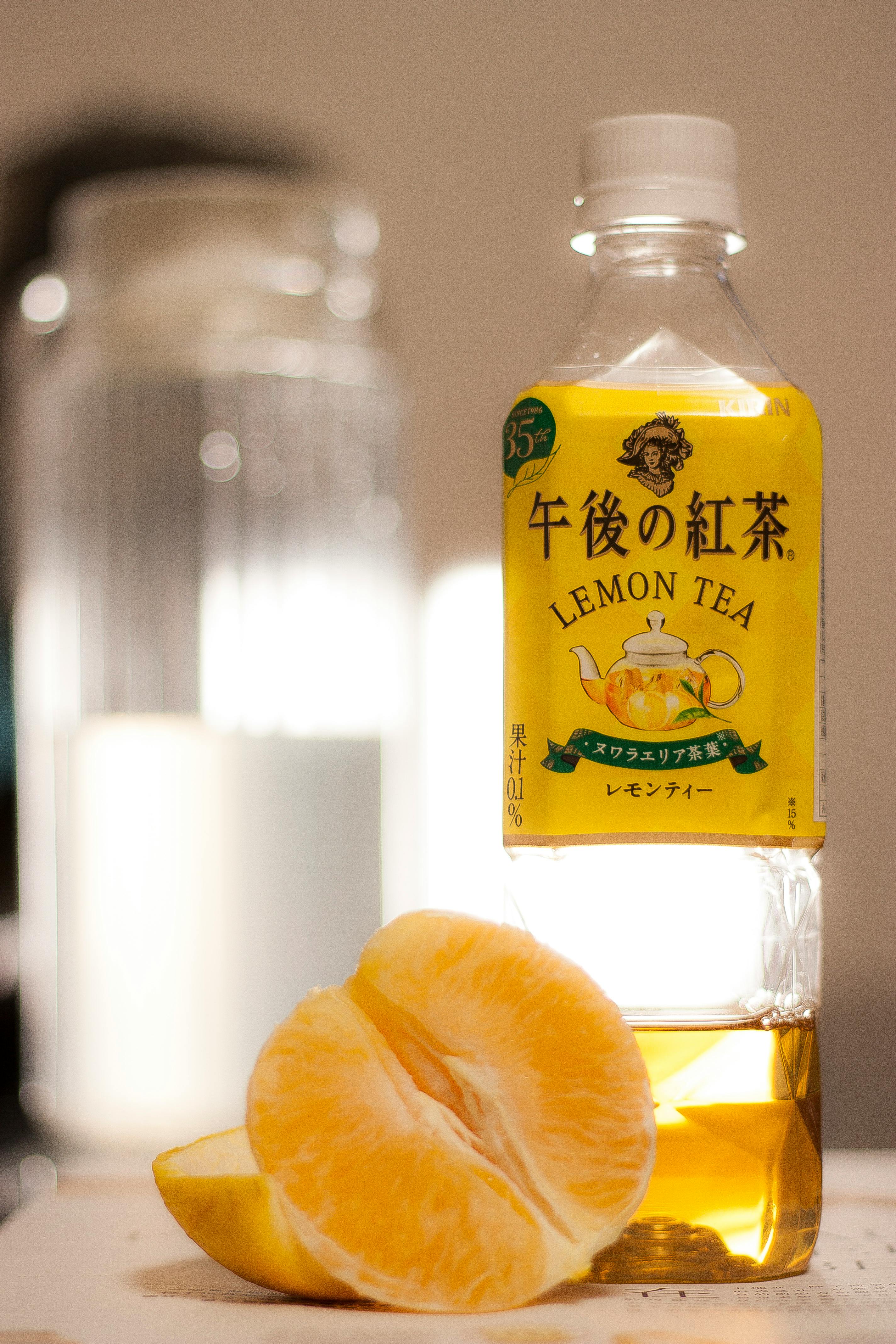 Close-Up Shot of a Bottle of Lemon Tea · Free Stock Photo