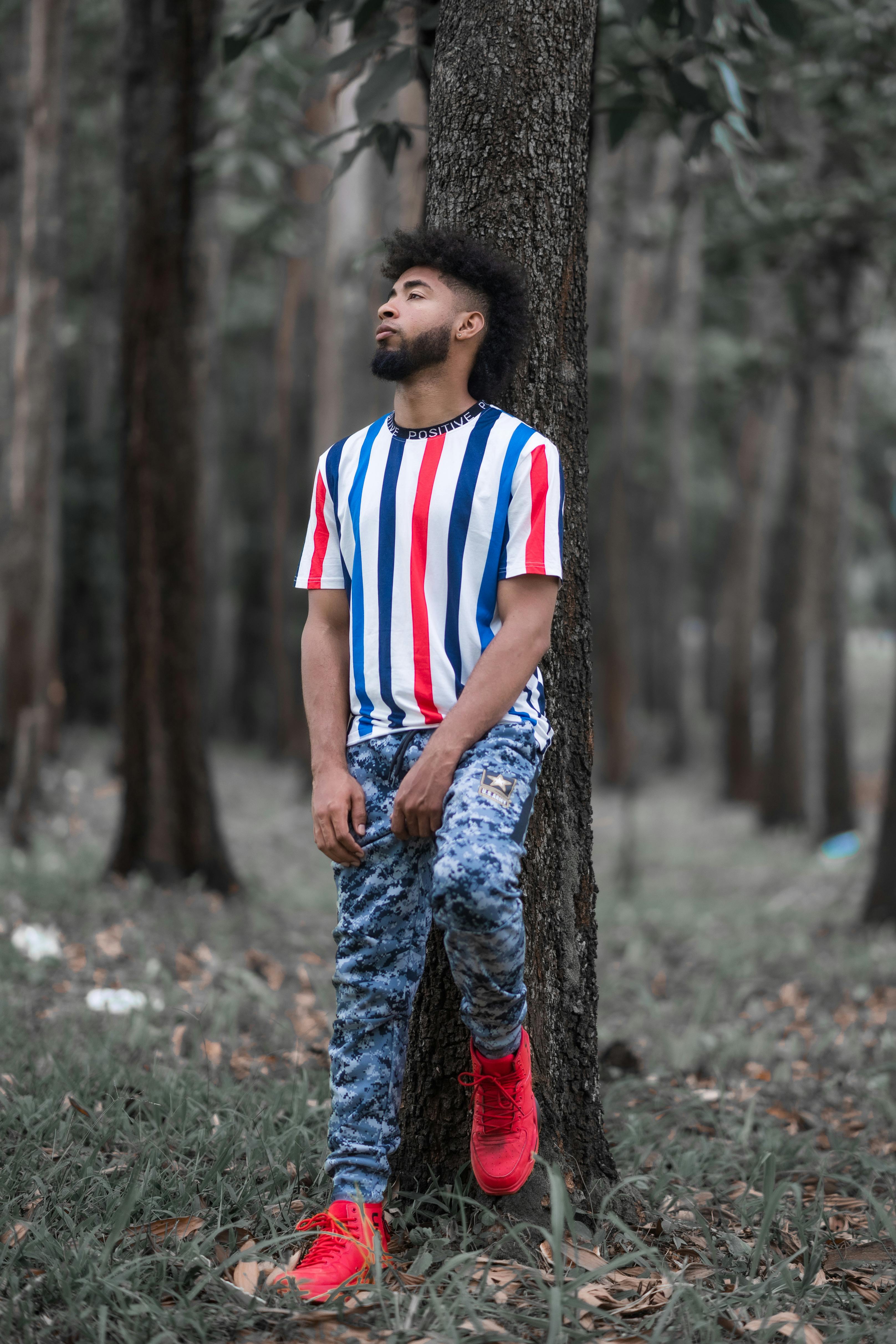 Photo of Man in Yellow Long-sleeved Sweatshirt Standing Outdoor · Free ...