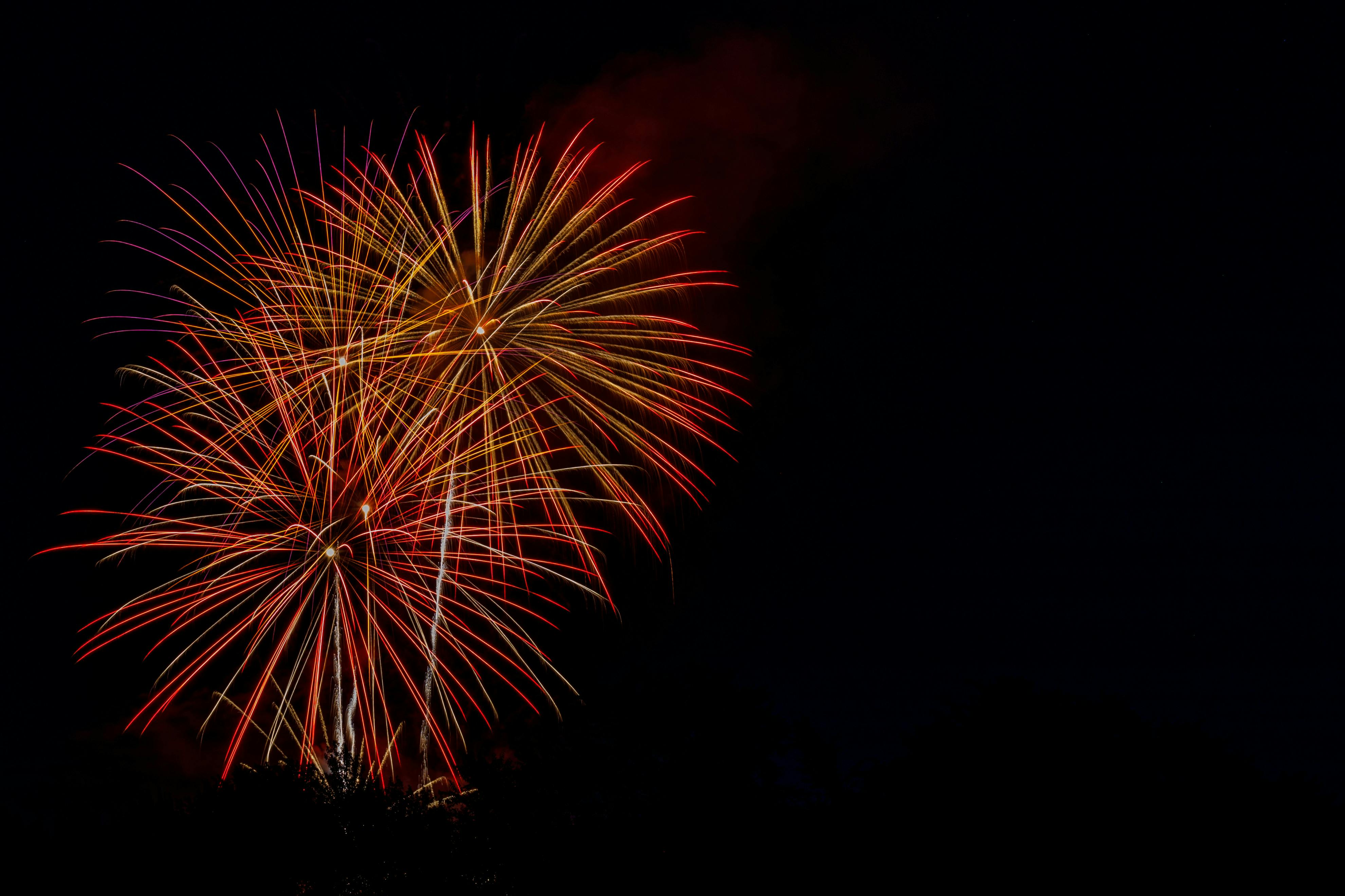 Red and Gold Fireworks Display during Night Time · Free Stock Photo