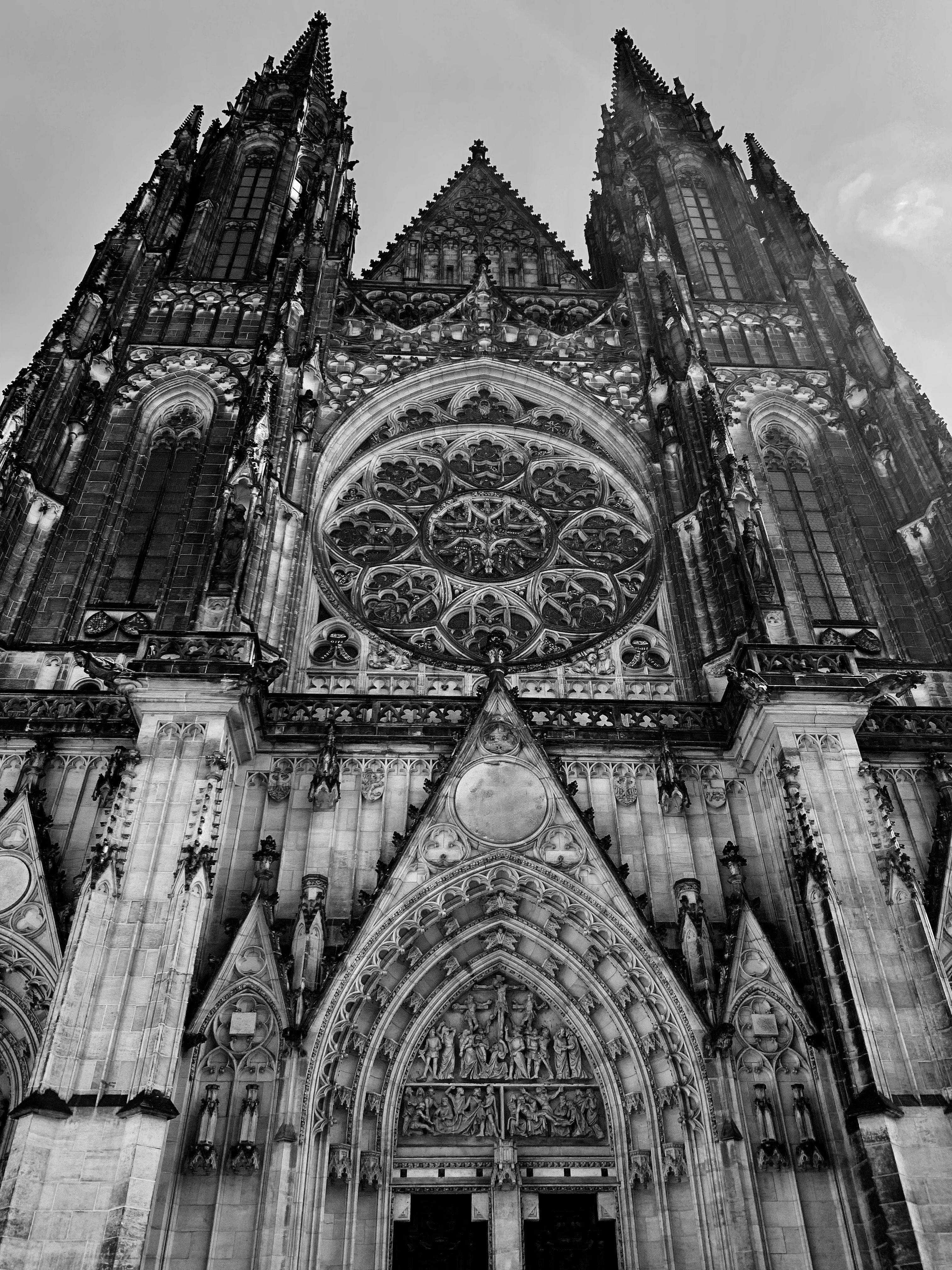 Grayscale Photo of a Gothic Building · Free Stock Photo