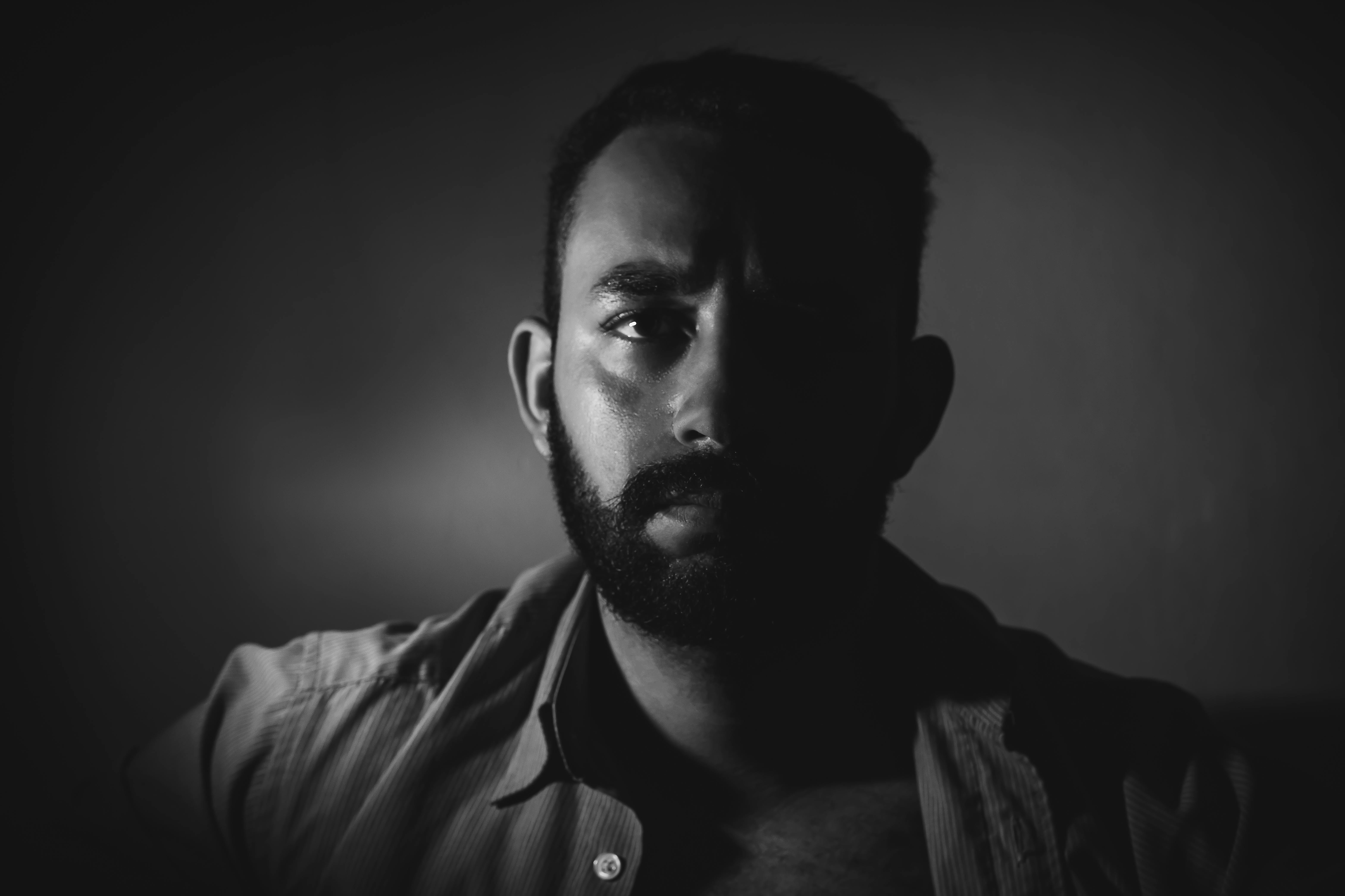 Man Posing with Sword · Free Stock Photo