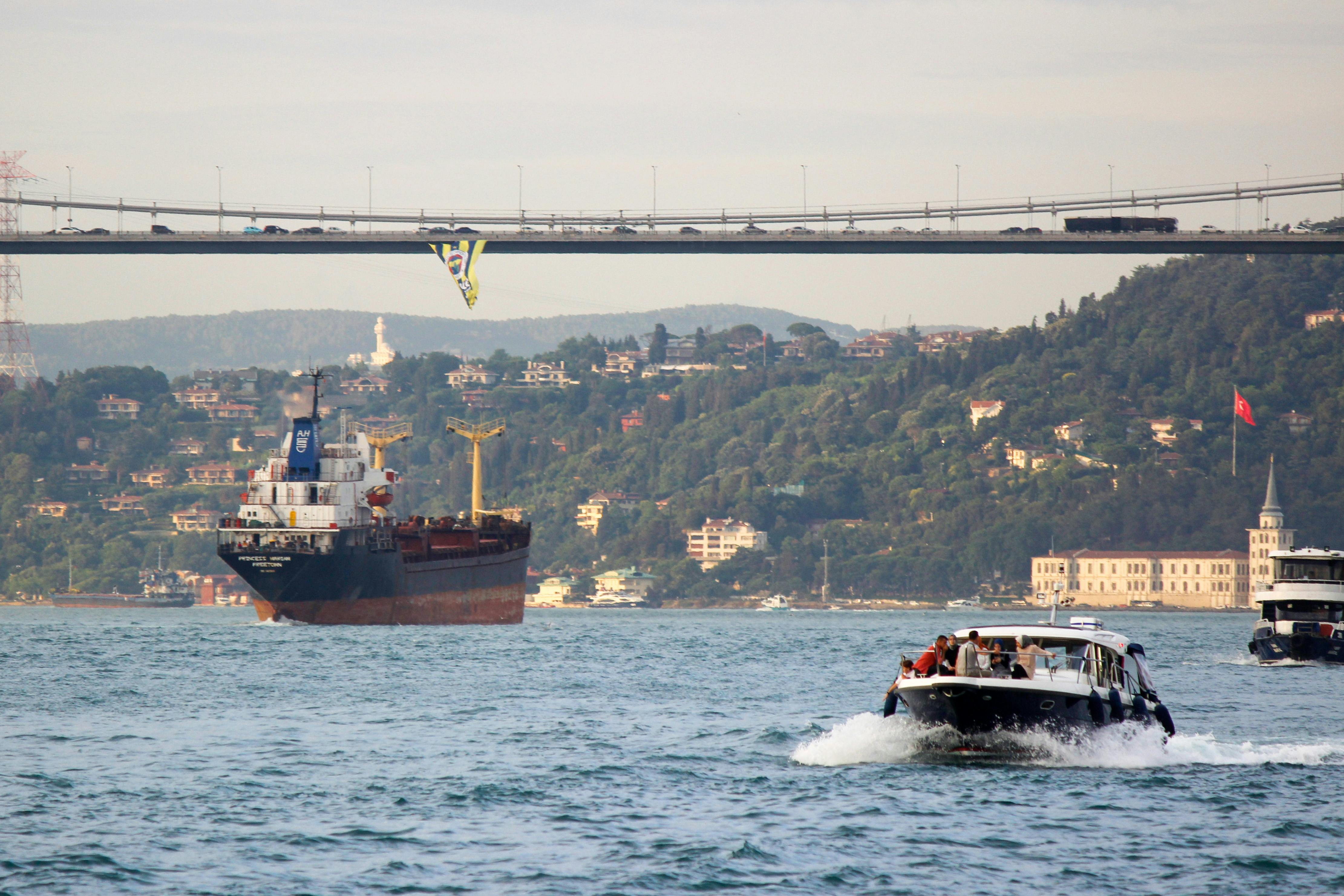 Ship and Boats on a River · Free Stock Photo