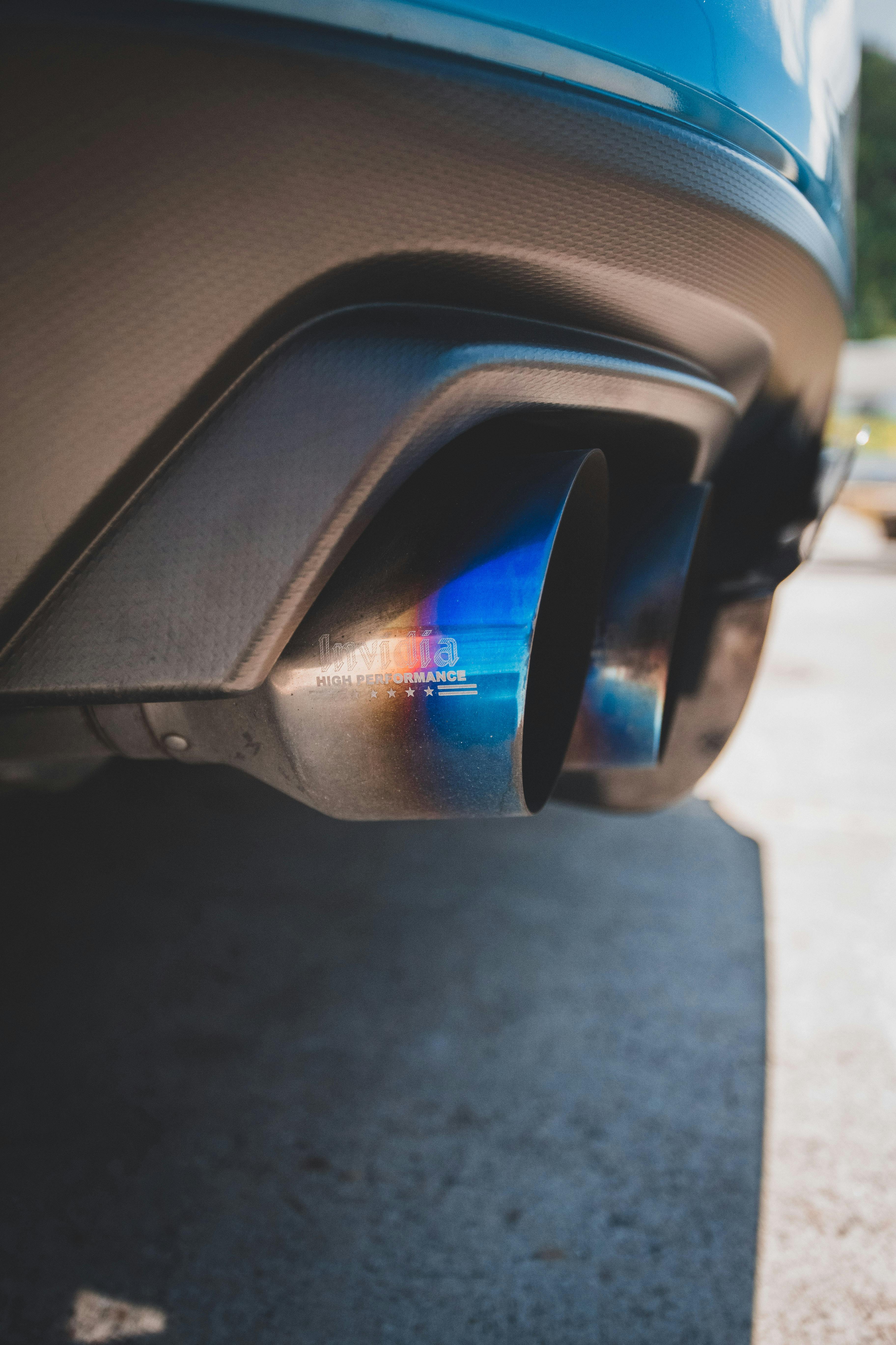 Close-up of an Exhaust Pipes of a Car · Free Stock Photo