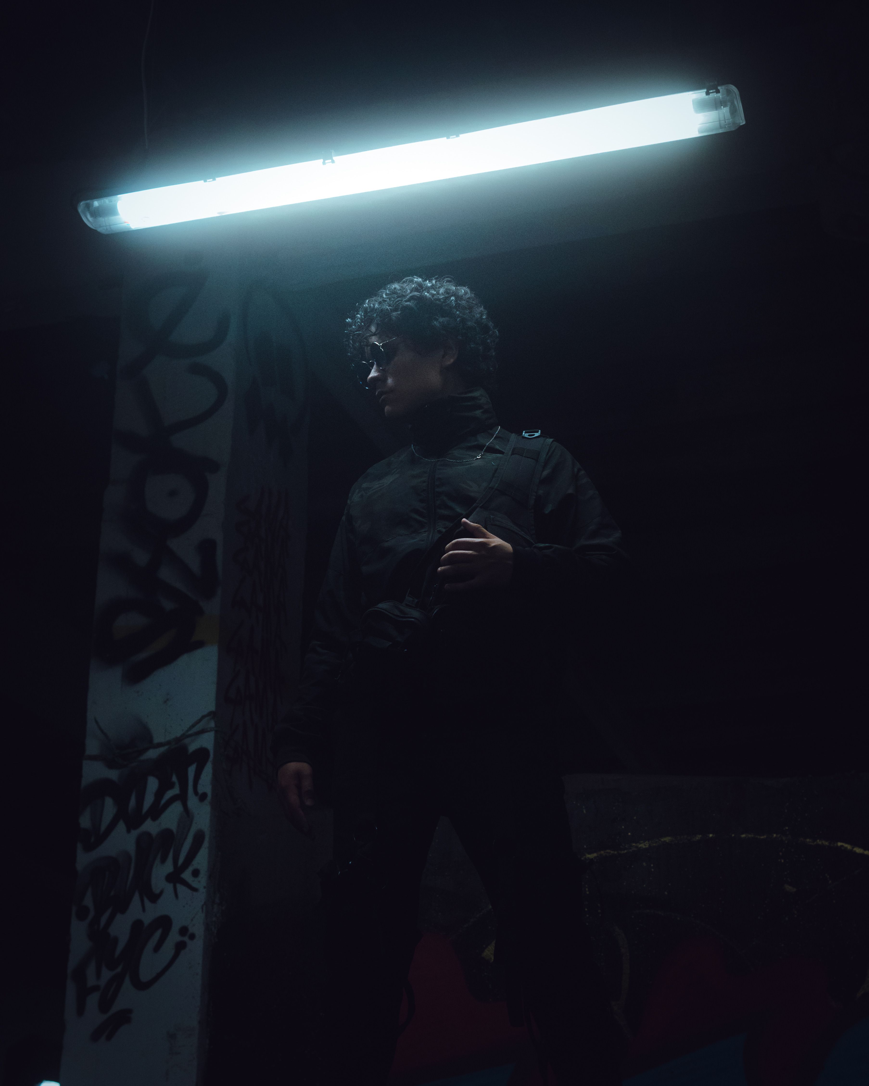 Portrait of a Man Standing under a Light · Free Stock Photo