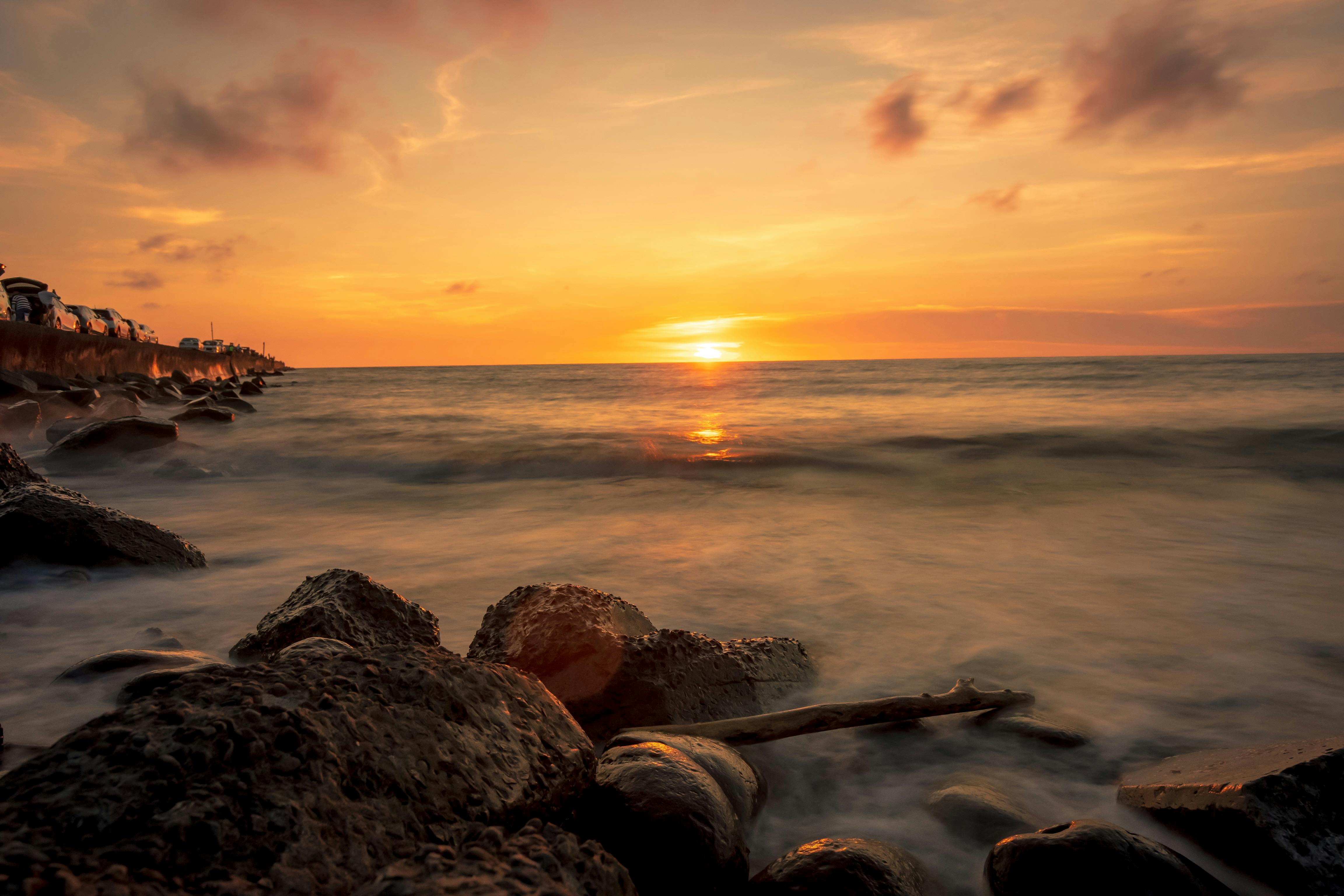 Rocks on the Ocean during Sunset · Free Stock Photo