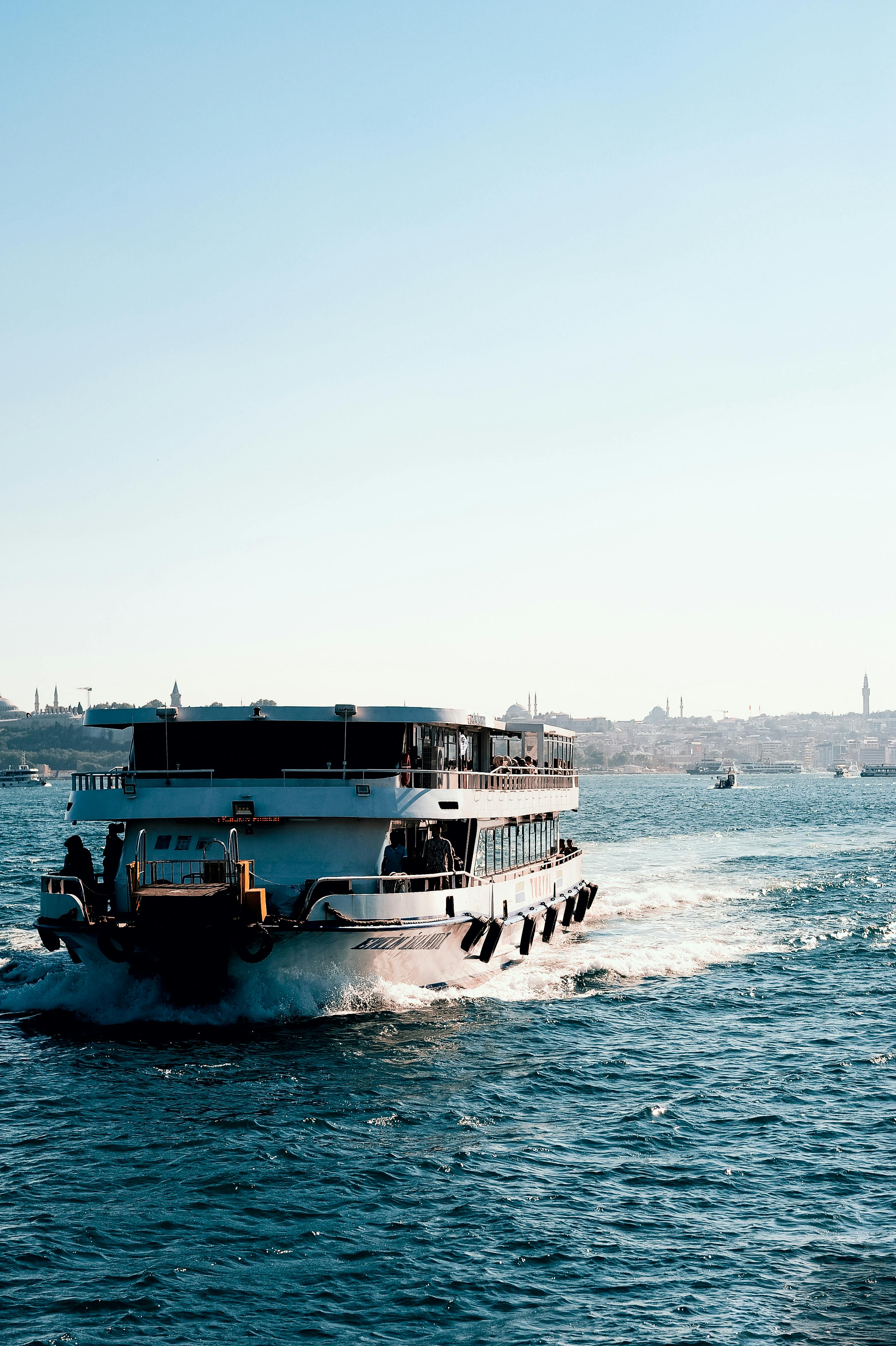 Ferry on Body of Water · Free Stock Photo