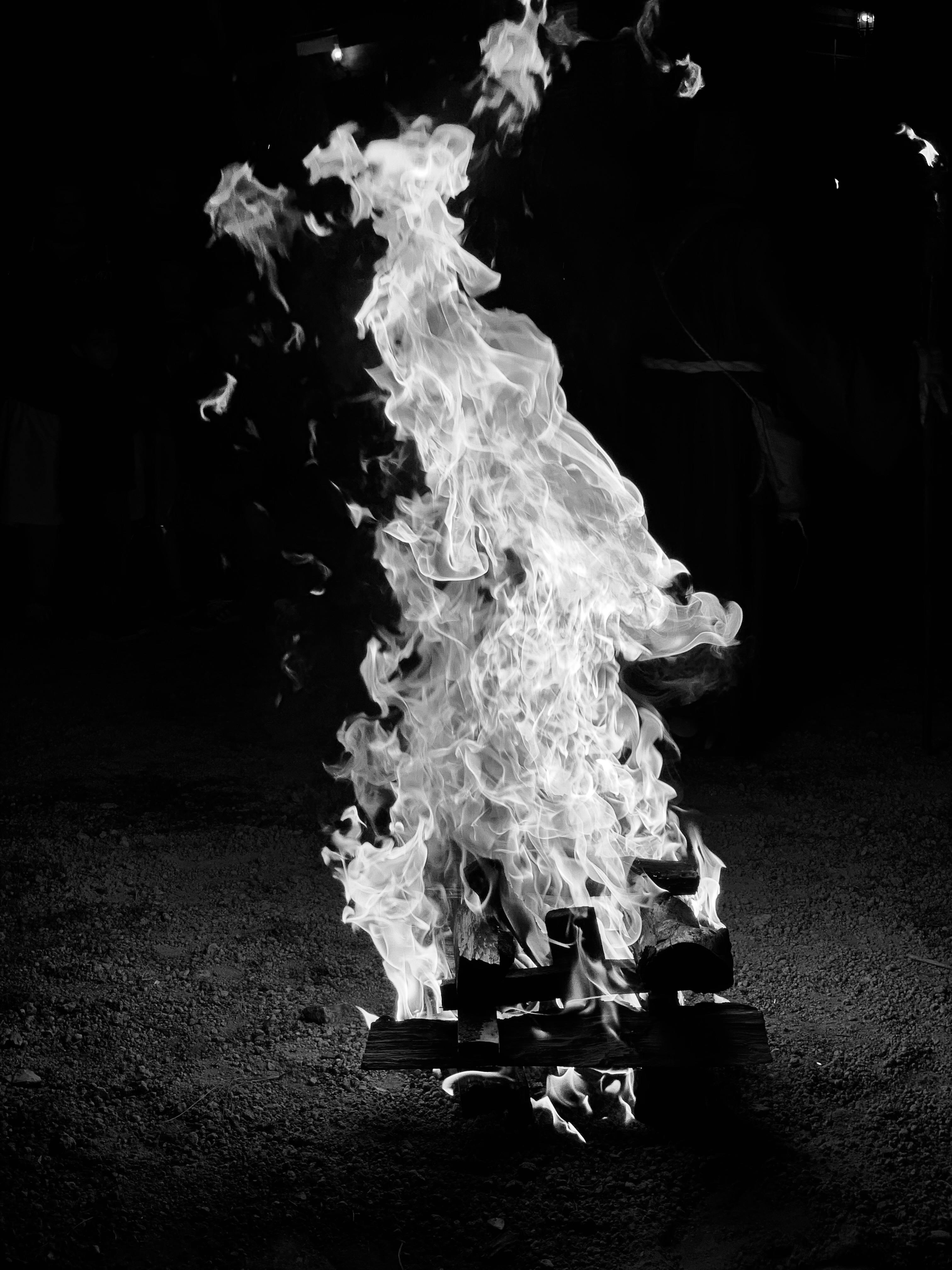 A Grayscale of a Lit Candle · Free Stock Photo