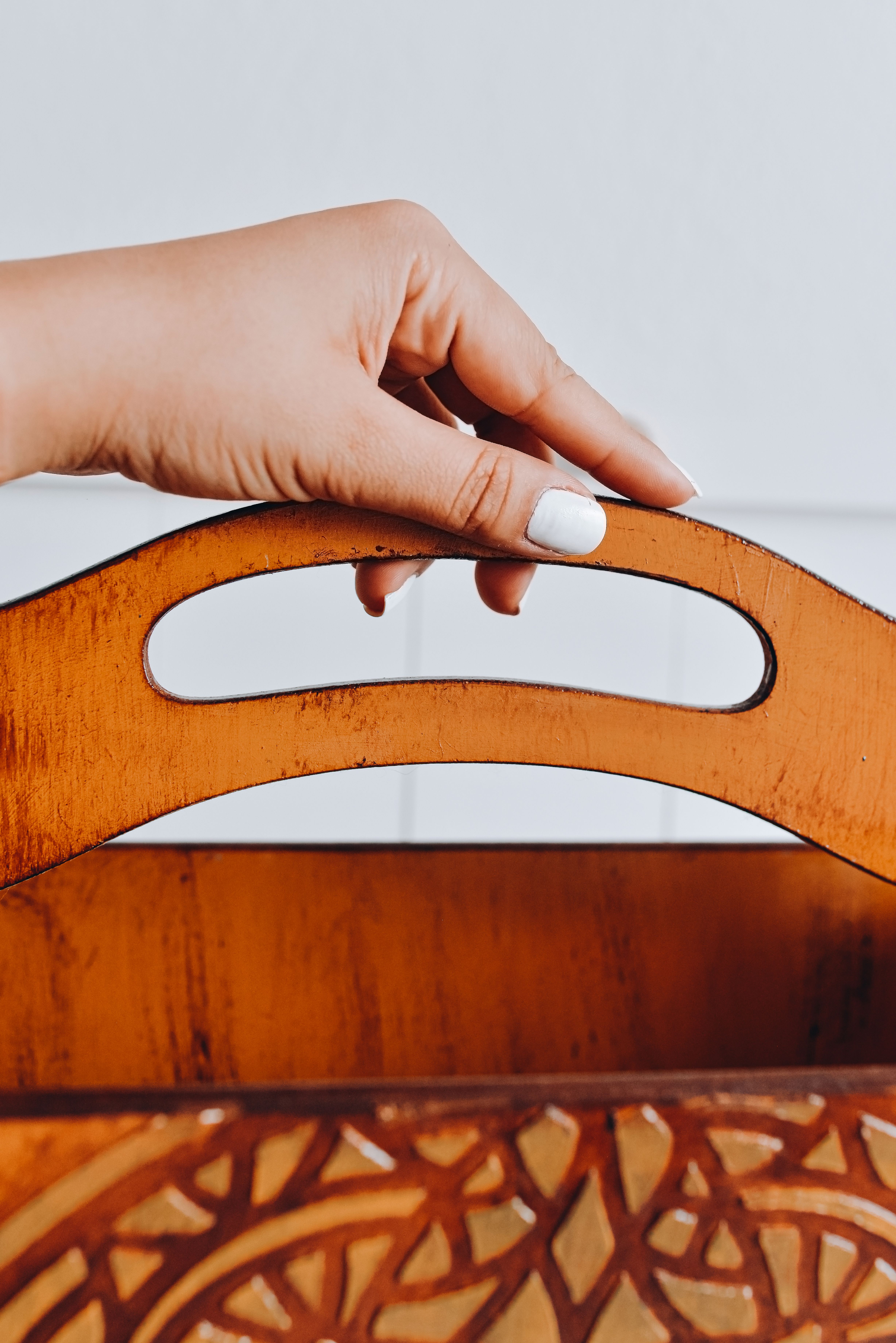 Photo of a Hand on the top of a Wooden Chair · Free Stock Photo