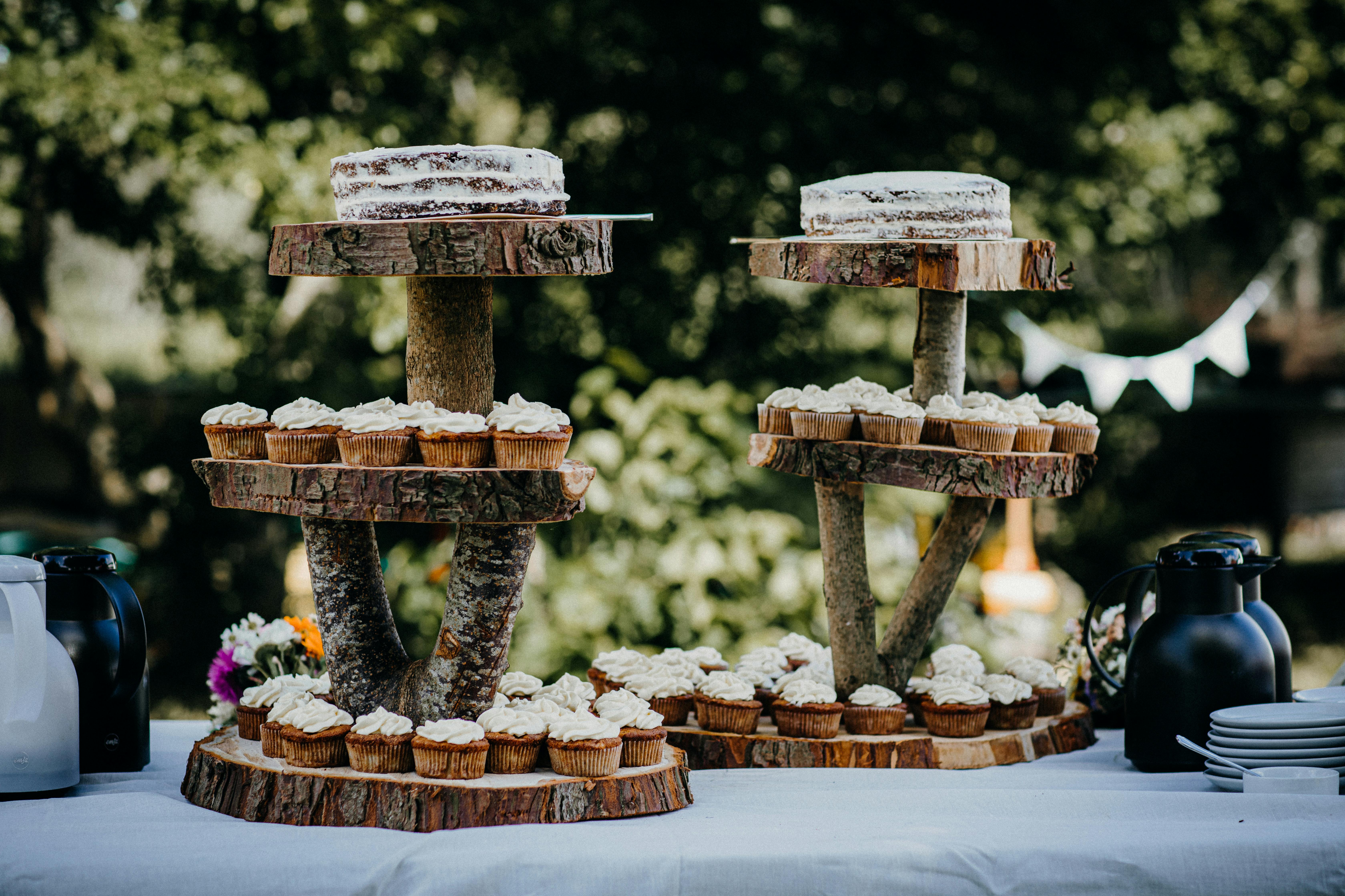 Cupcake Buffet Served on Log Layer Cake Stand · Free Stock Photo