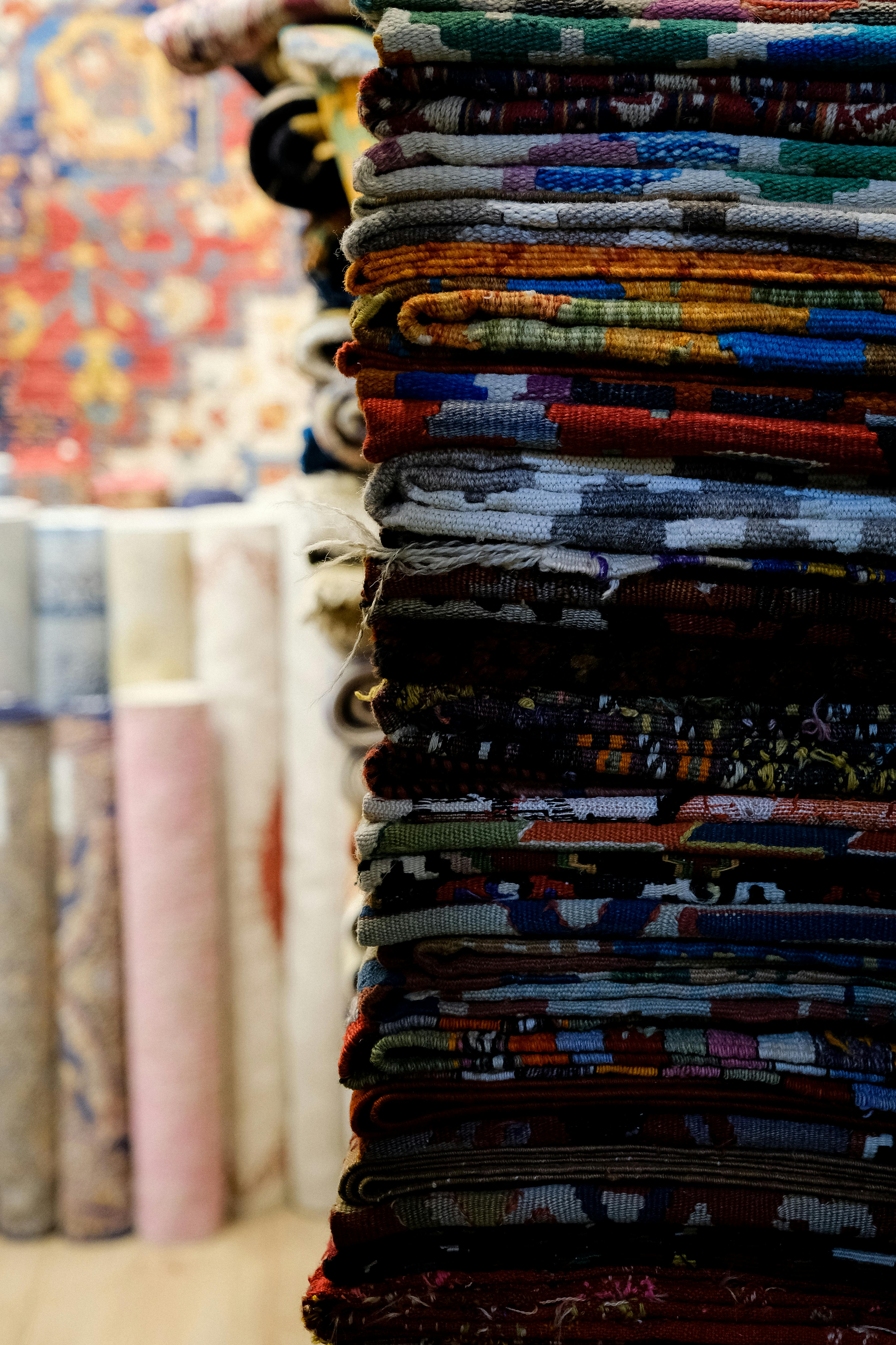 Close-up Photo of Stacked Fabrics · Free Stock Photo