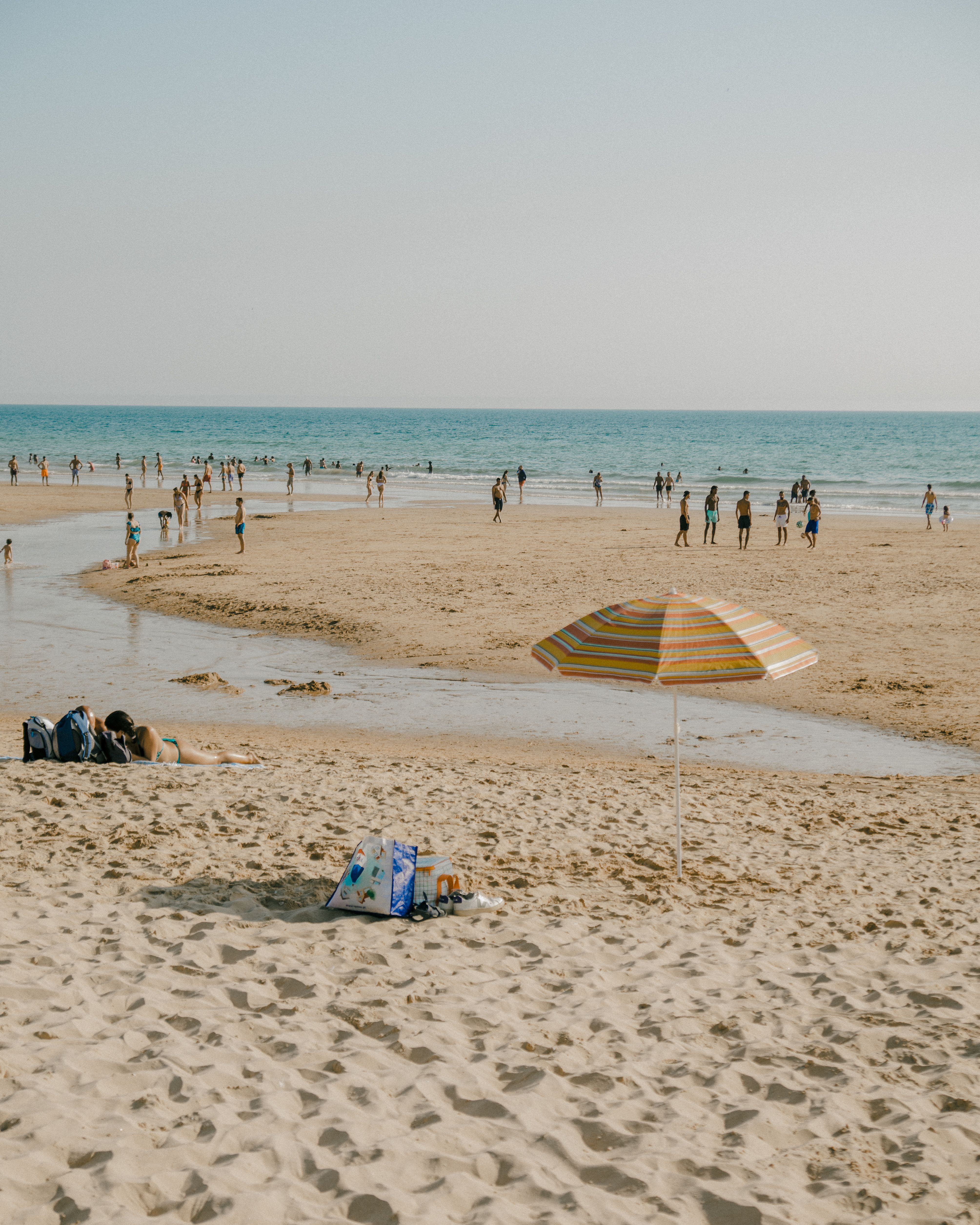 People Spending Time at a Beach · Free Stock Photo