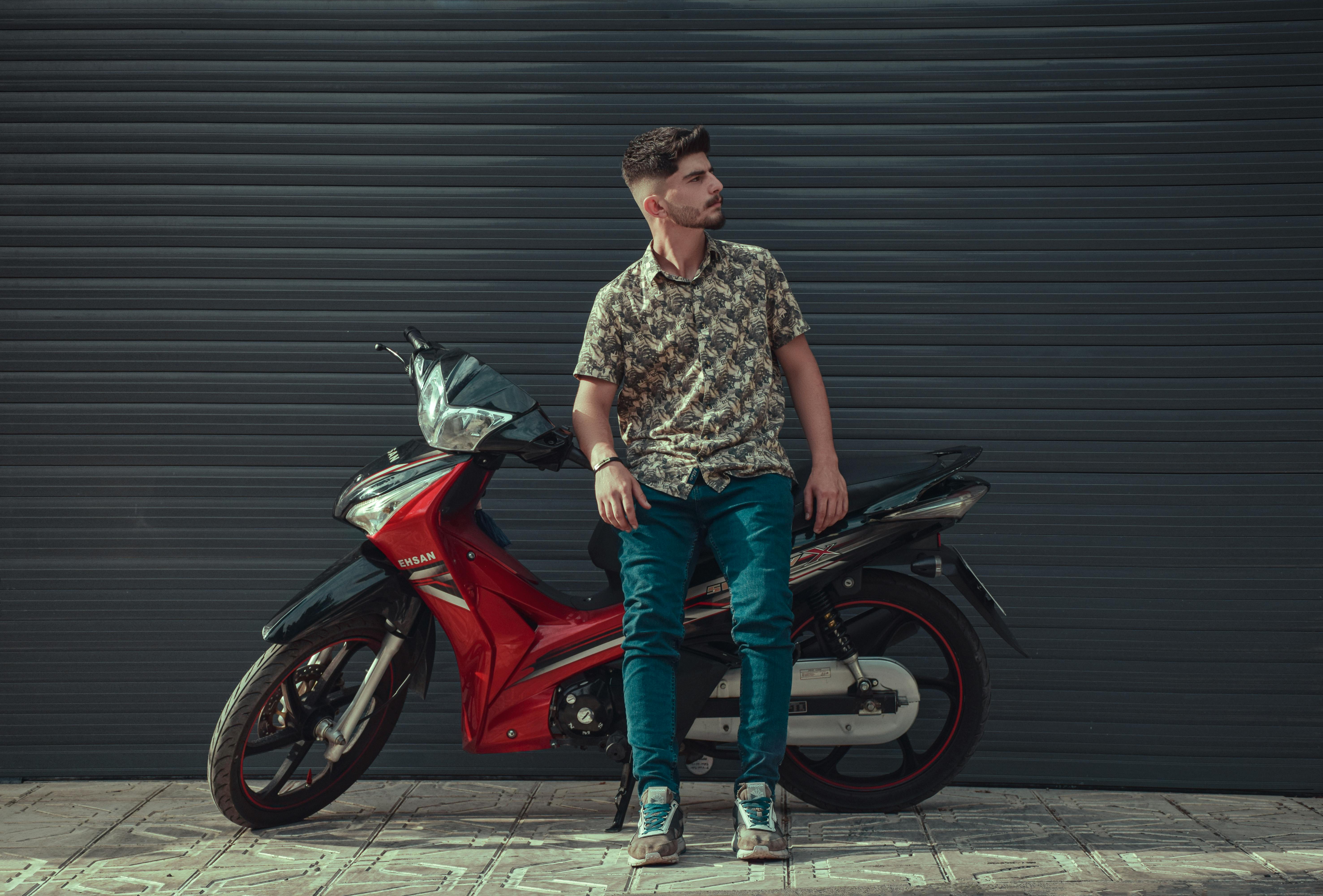 Man Leaning on Motorcycle · Free Stock Photo