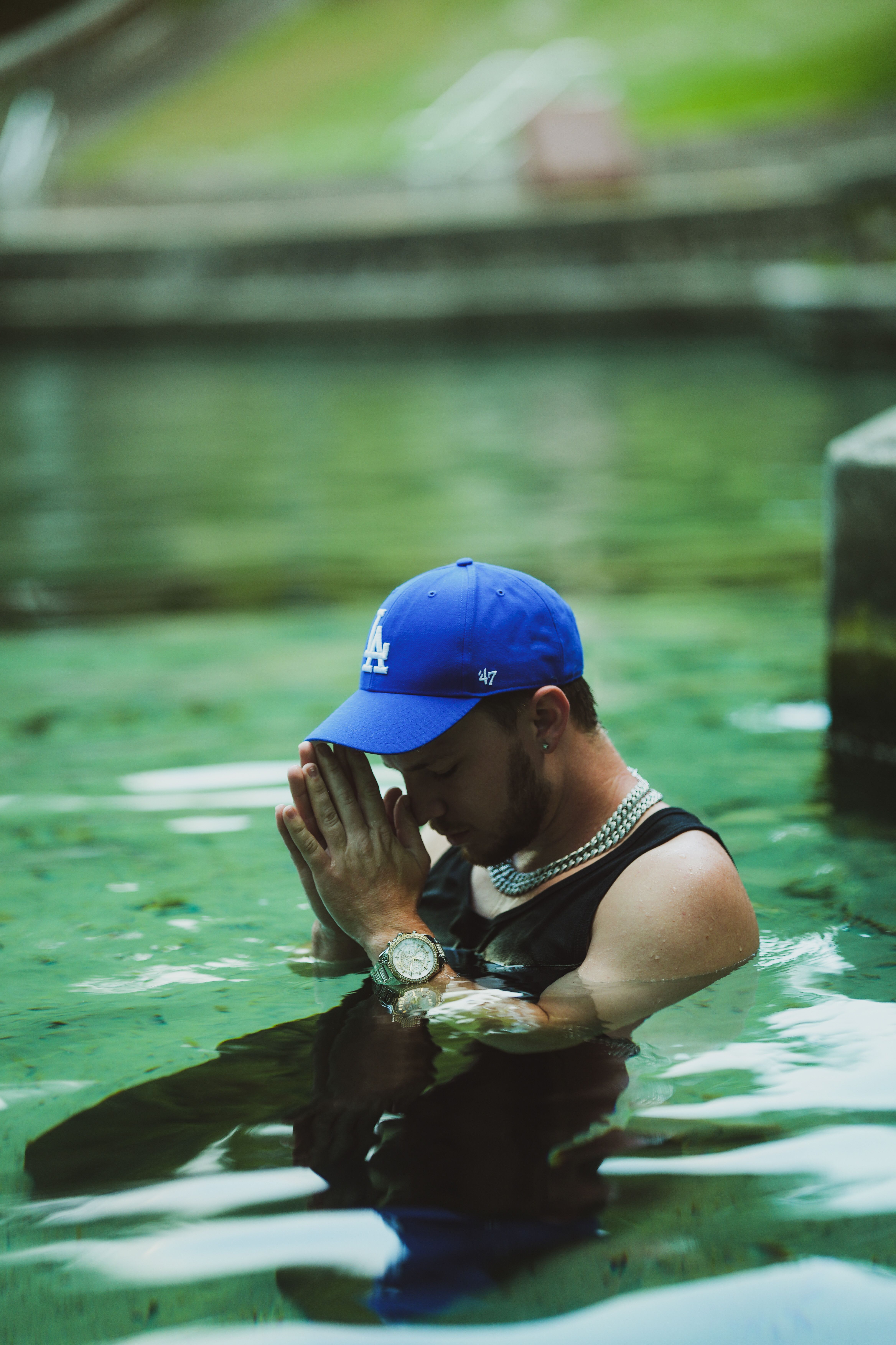 Man Praying in Water · Free Stock Photo
