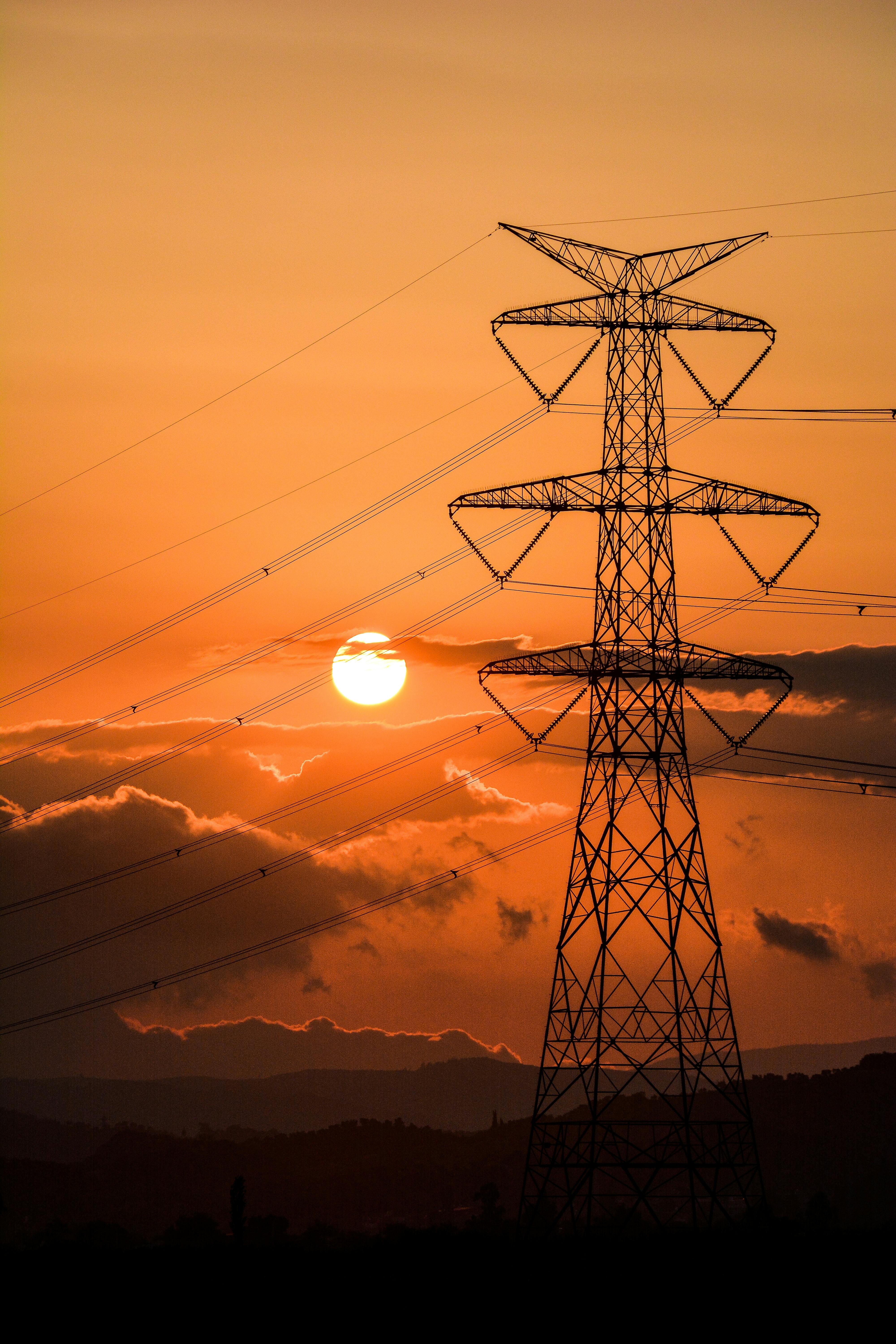 A Silhouette of an Overhead Power Line during the Golden Hour · Free ...