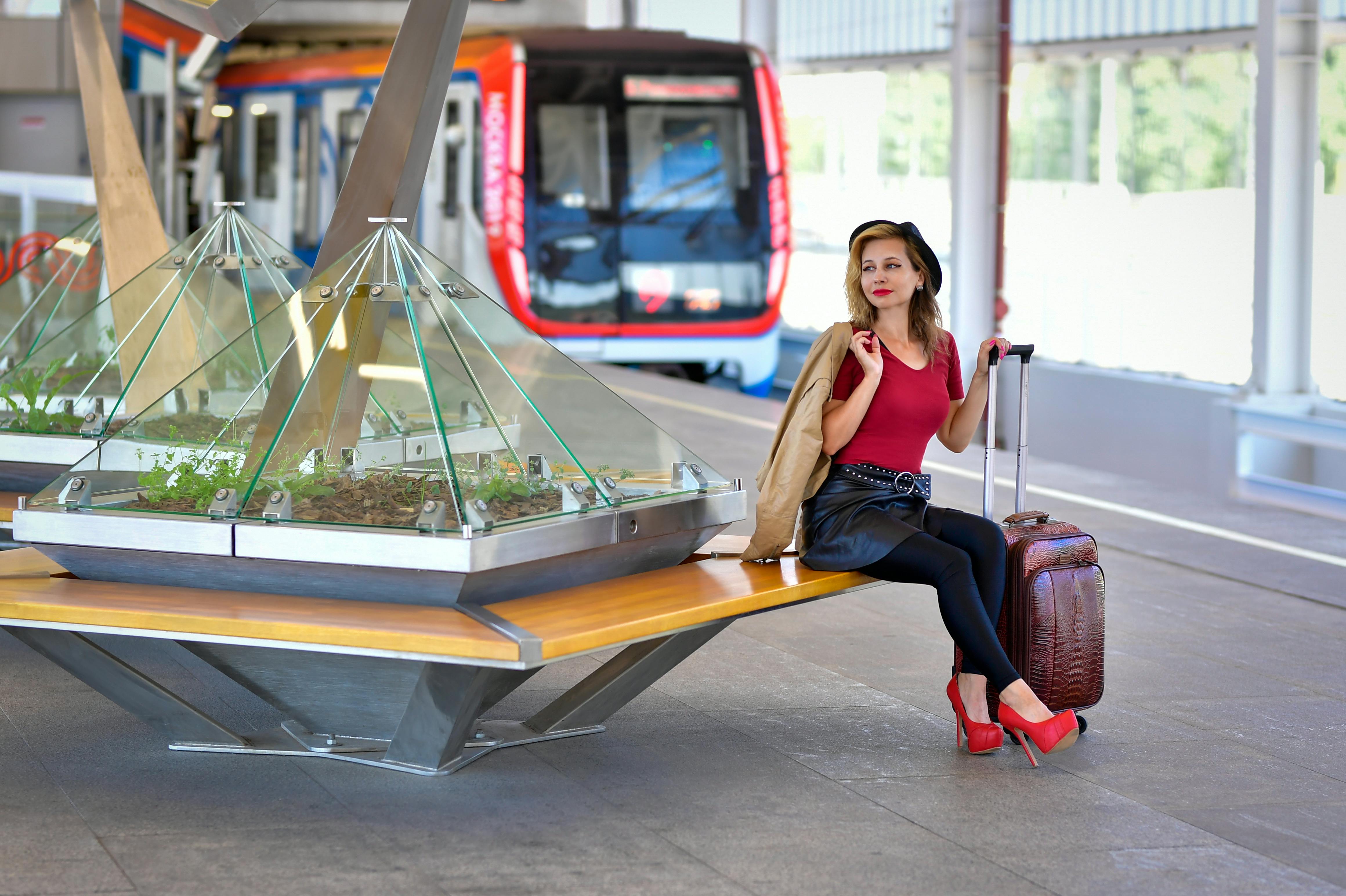 Woman Waiting at a Station · Free Stock Photo