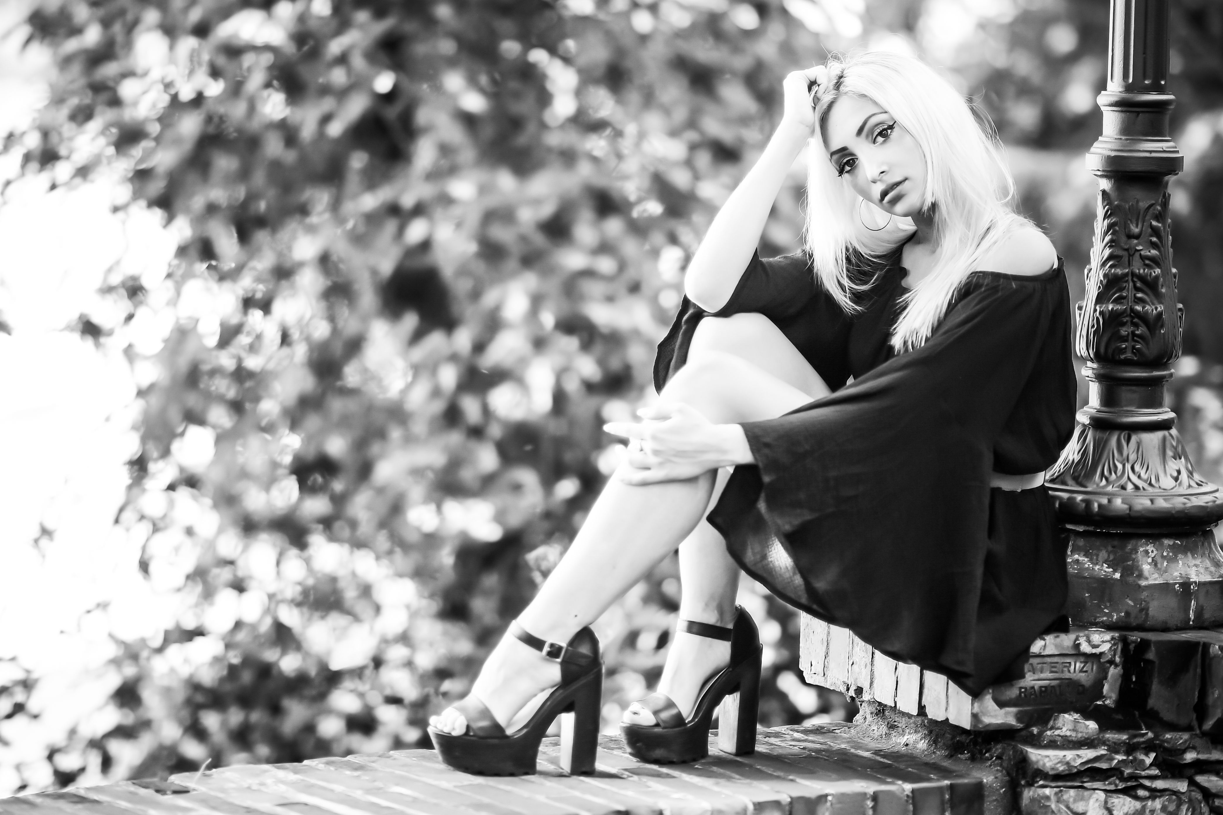 A Woman in Black Dress Posing · Free Stock Photo