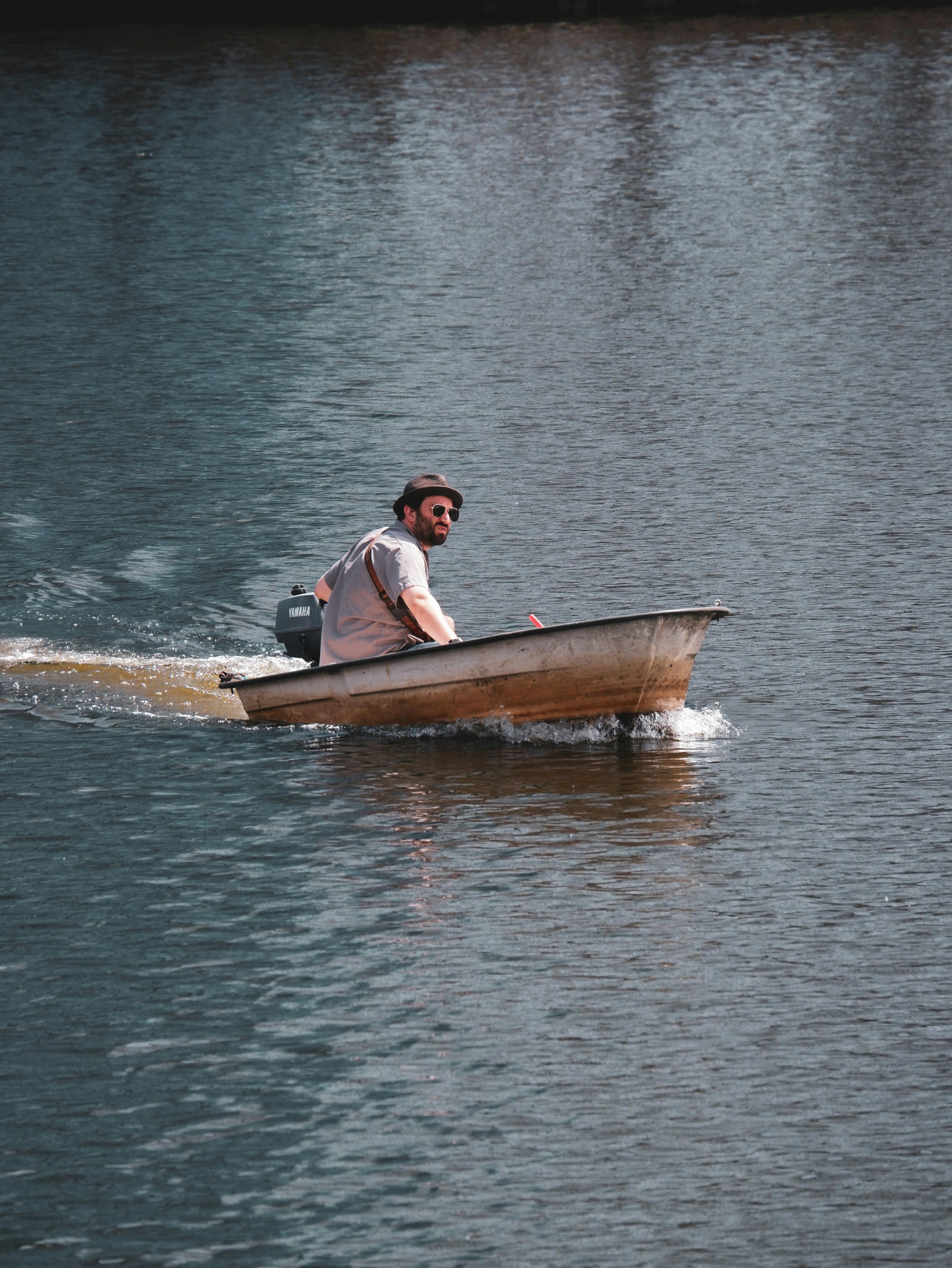 Man Riding Boat Photos, Download Free Man Riding Boat Stock Photos & HD ...