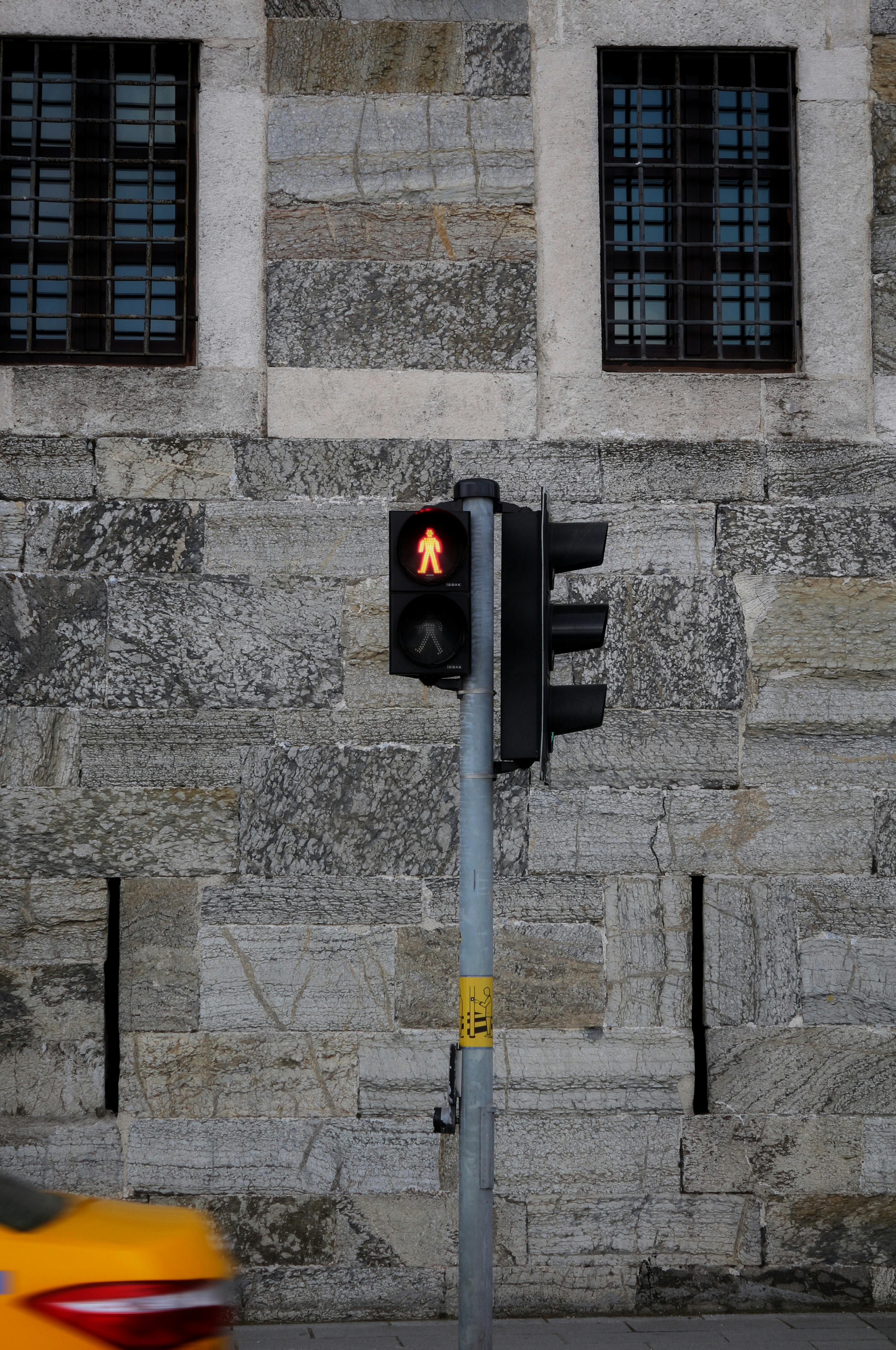 Red Light on the Crosswalk Lights and Facade of a Building in City ...