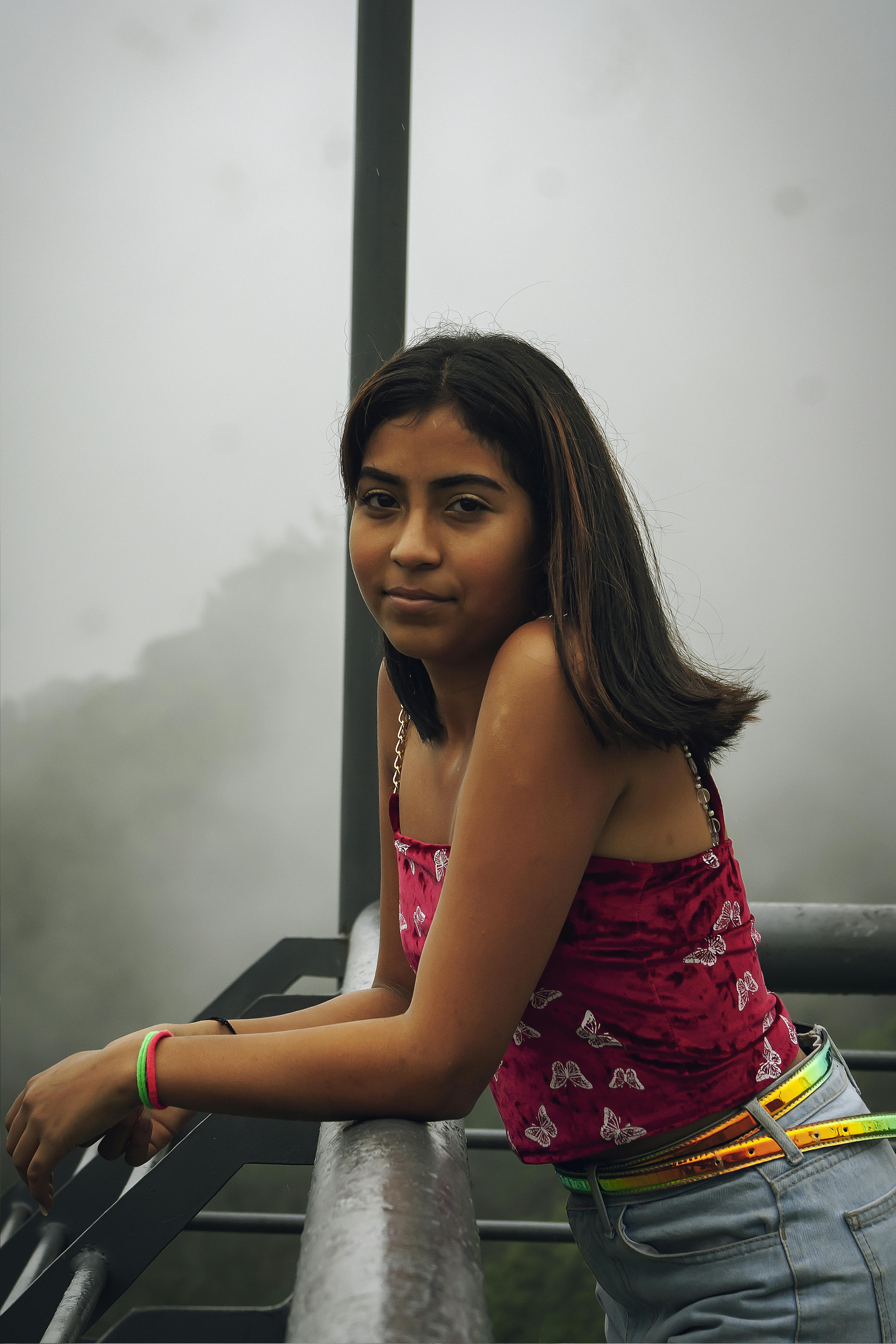 A Woman Leaning on Railing · Free Stock Photo