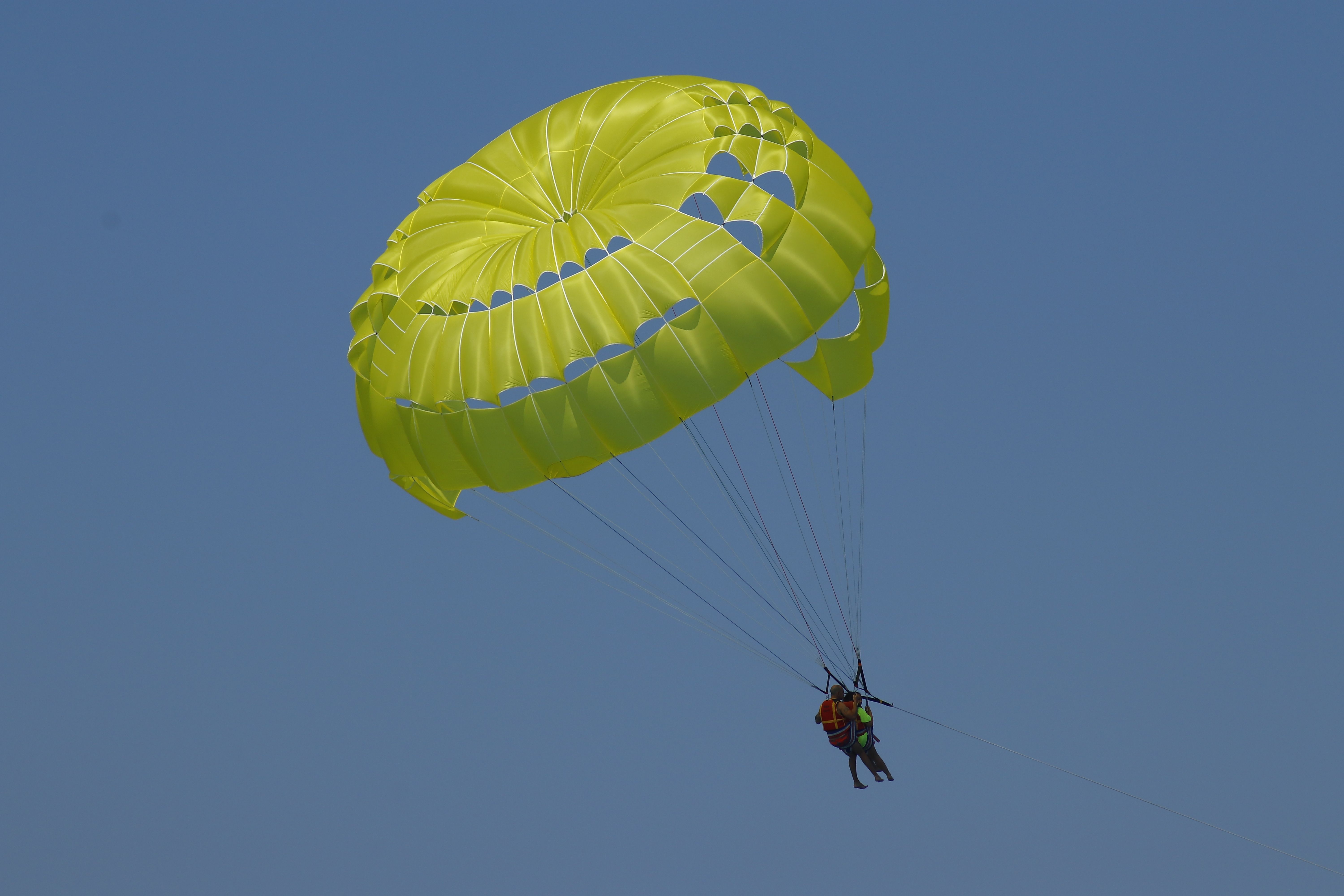 Man Jumping with Parachute · Free Stock Photo