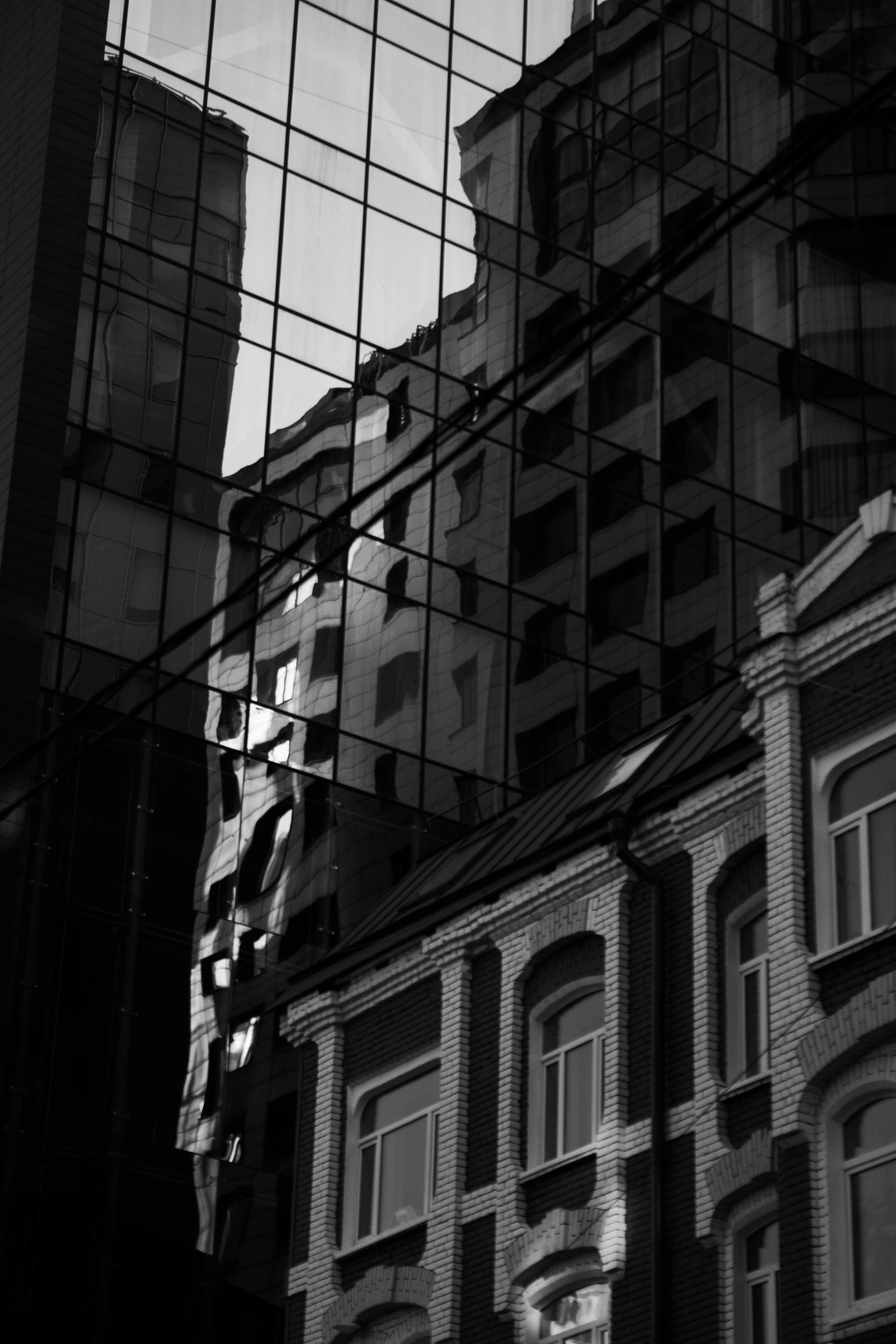 Grayscale Photo of High Rise Building · Free Stock Photo