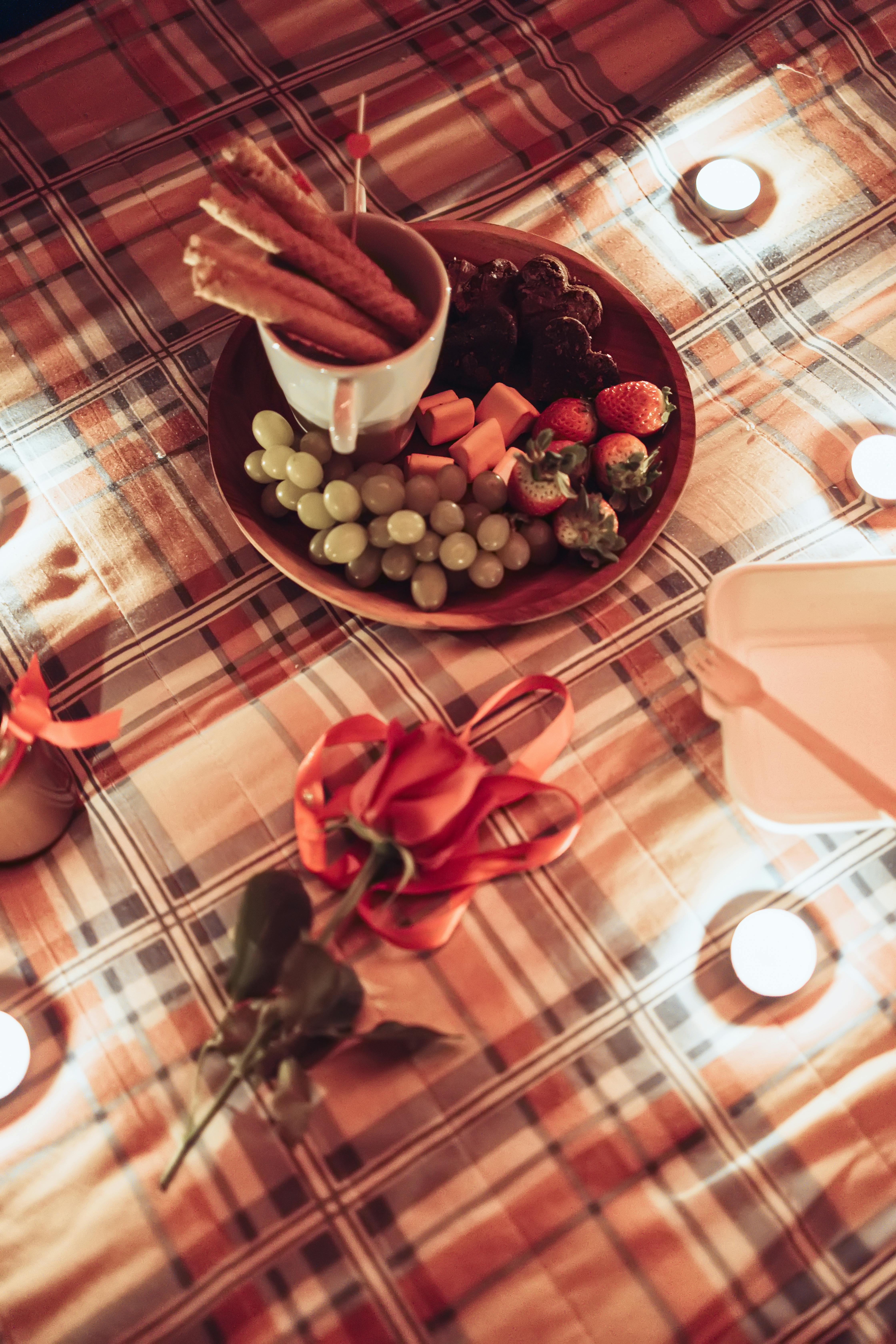 Rose and Snacks on Table · Free Stock Photo