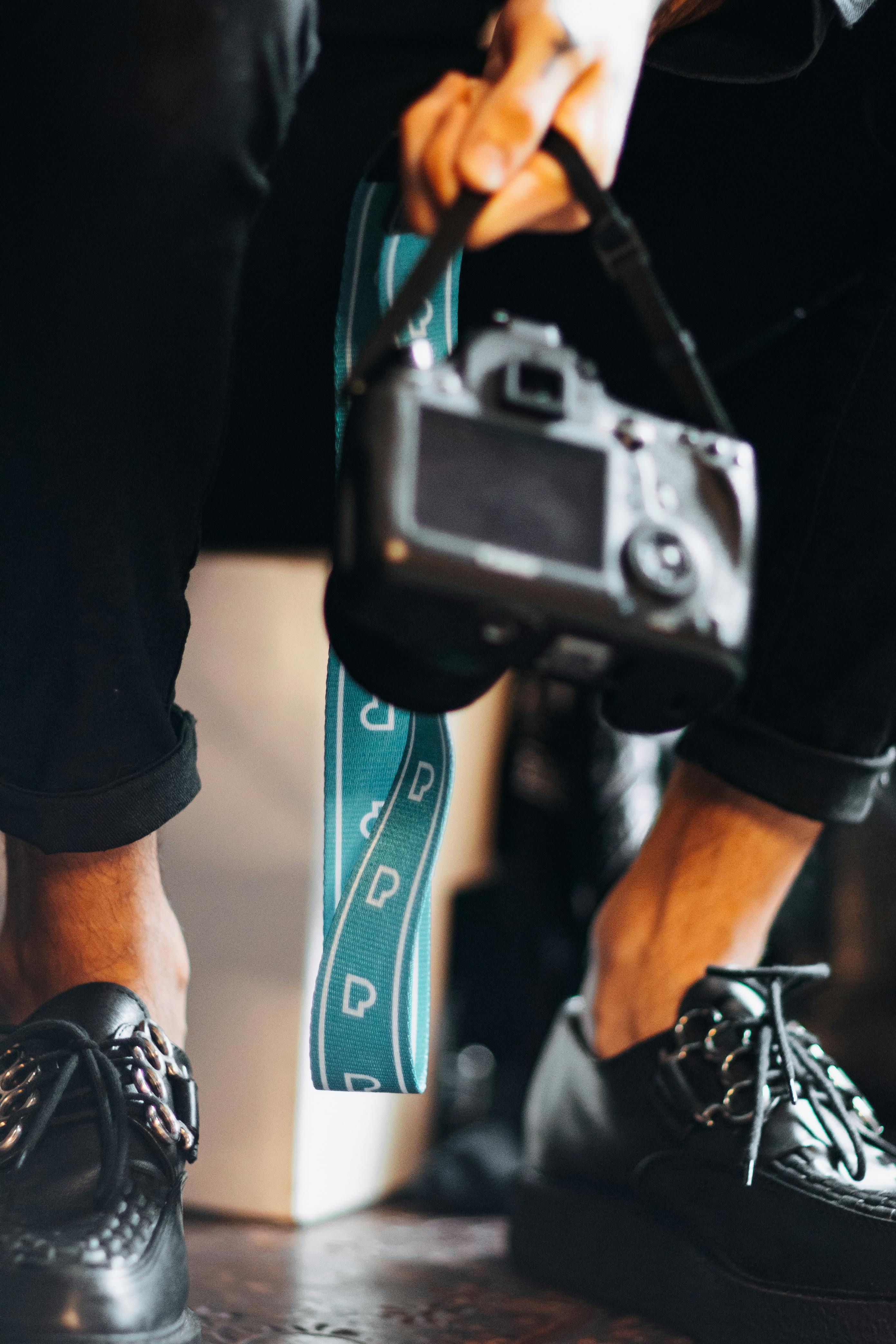 Person Holding a Camera · Free Stock Photo