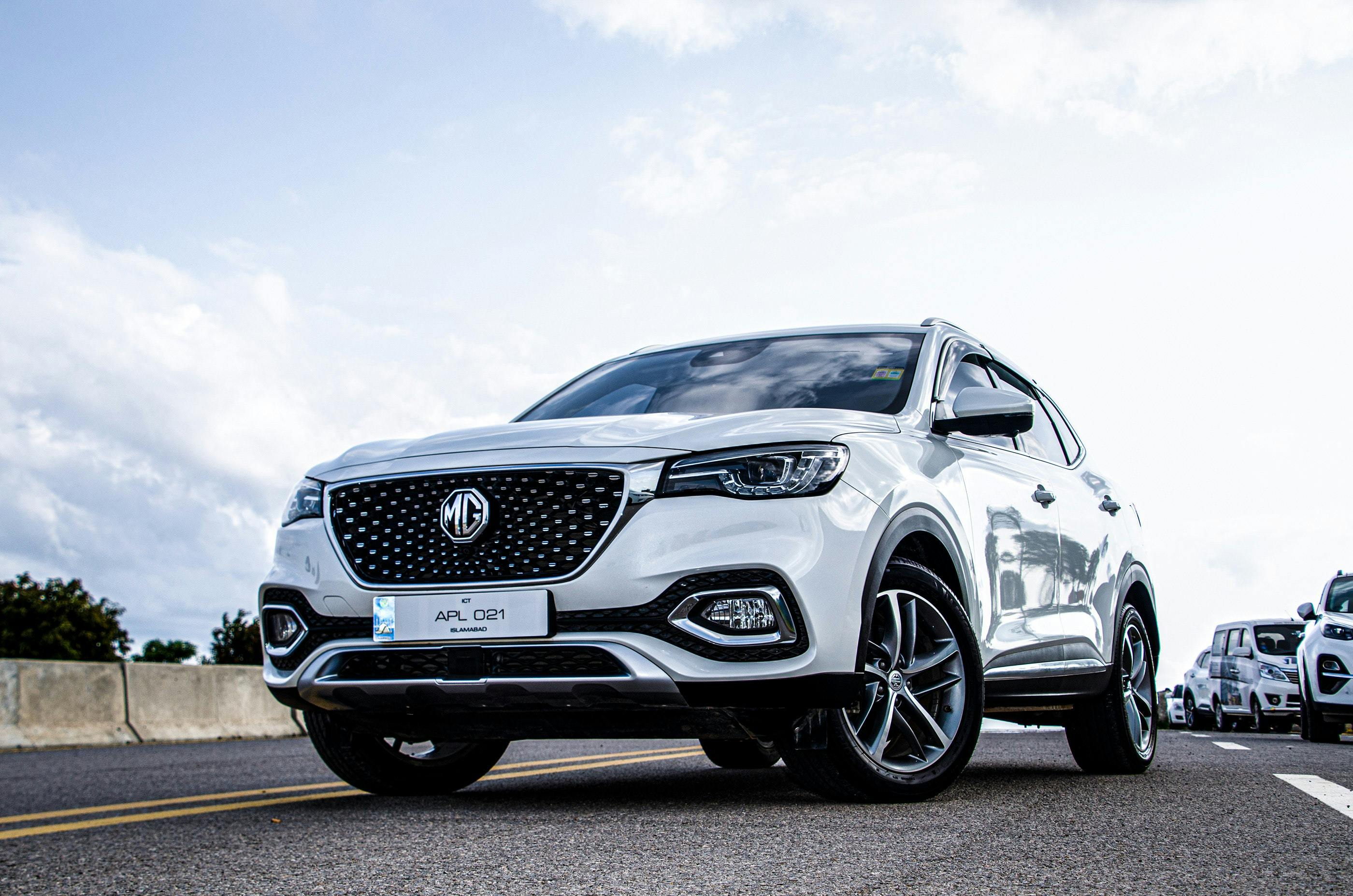 White Mg Car on the Road · Free Stock Photo