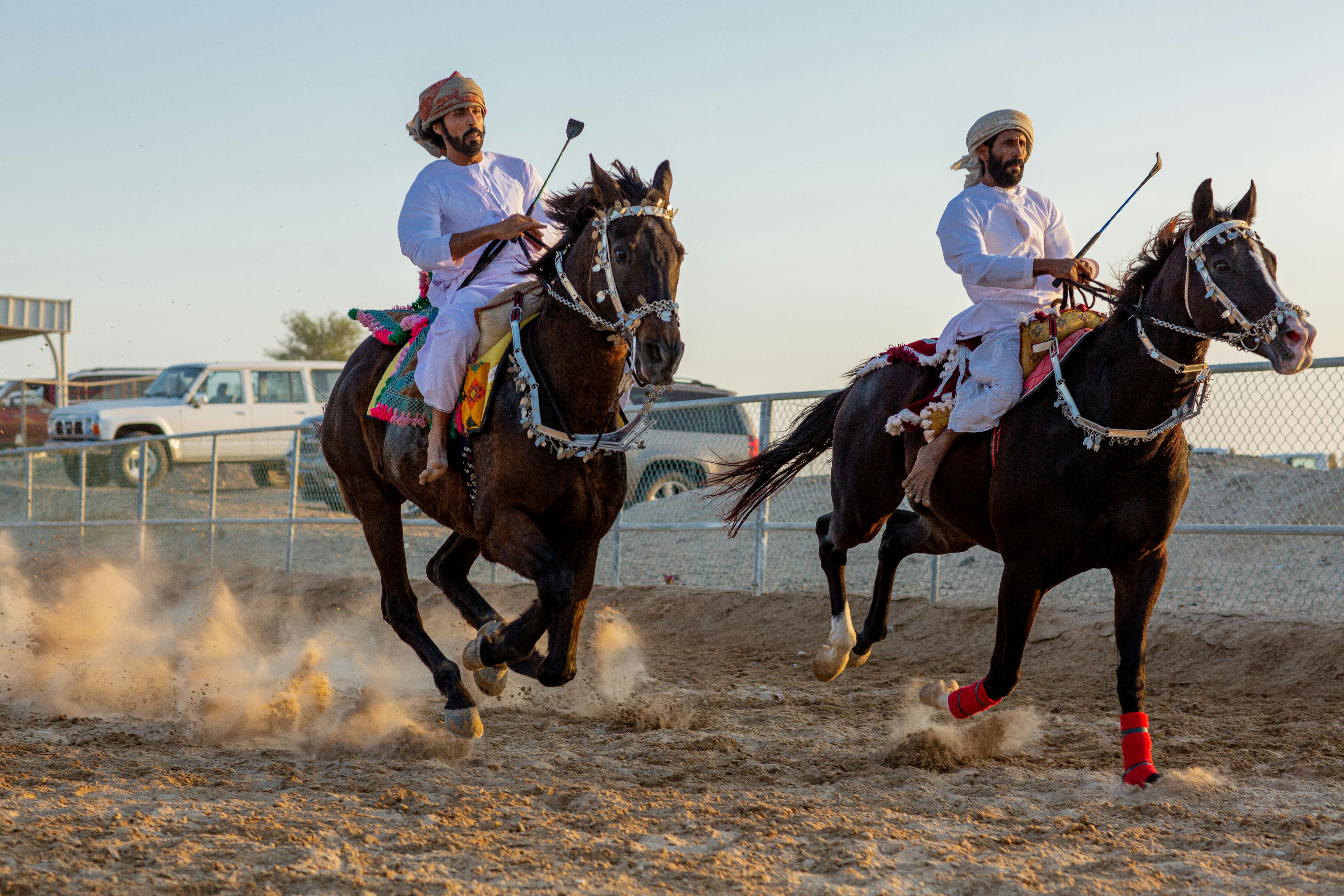 Arabic Men Riding Horses · Free Stock Photo