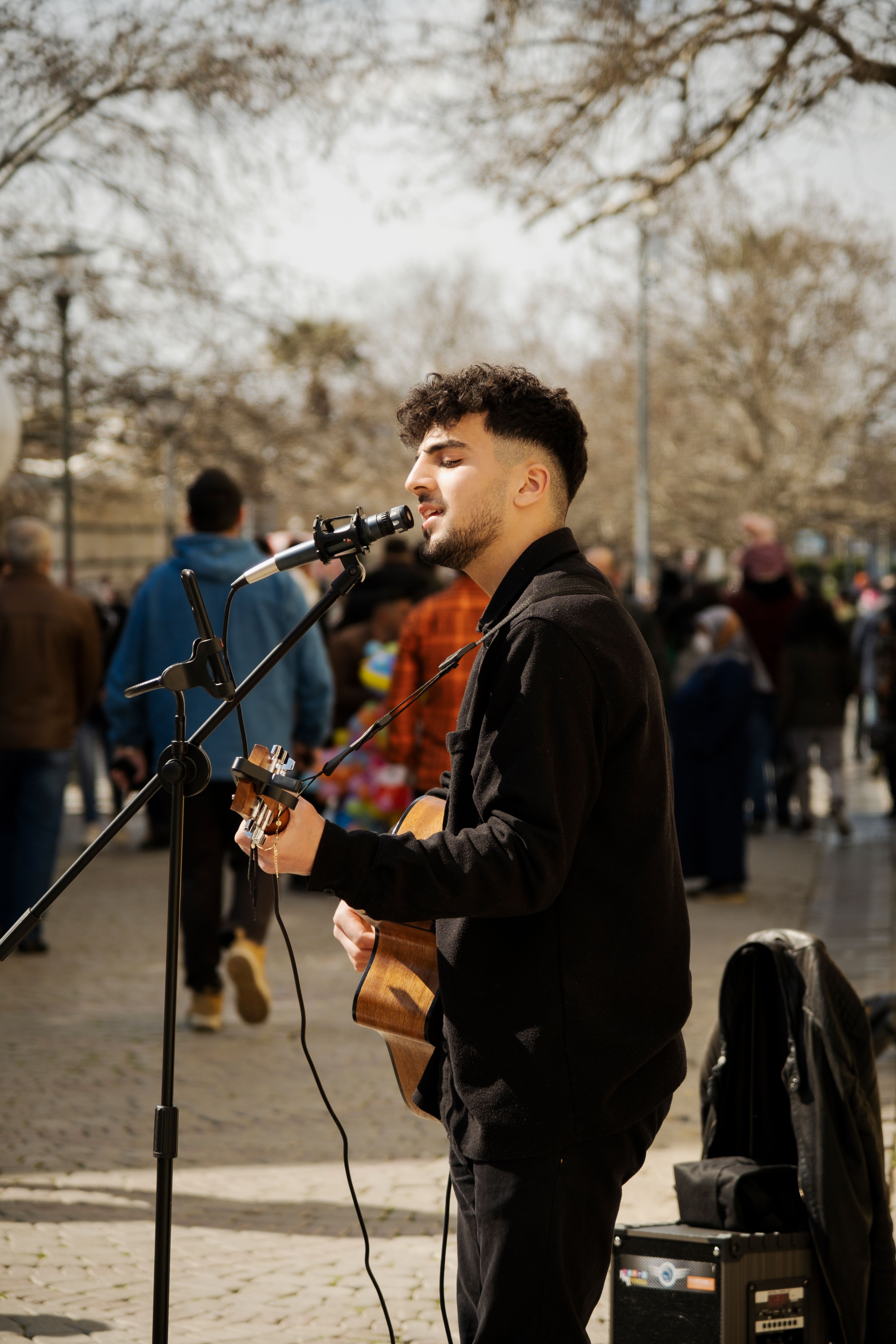 Man Playing Guitar and Singing on Street · Free Stock Photo