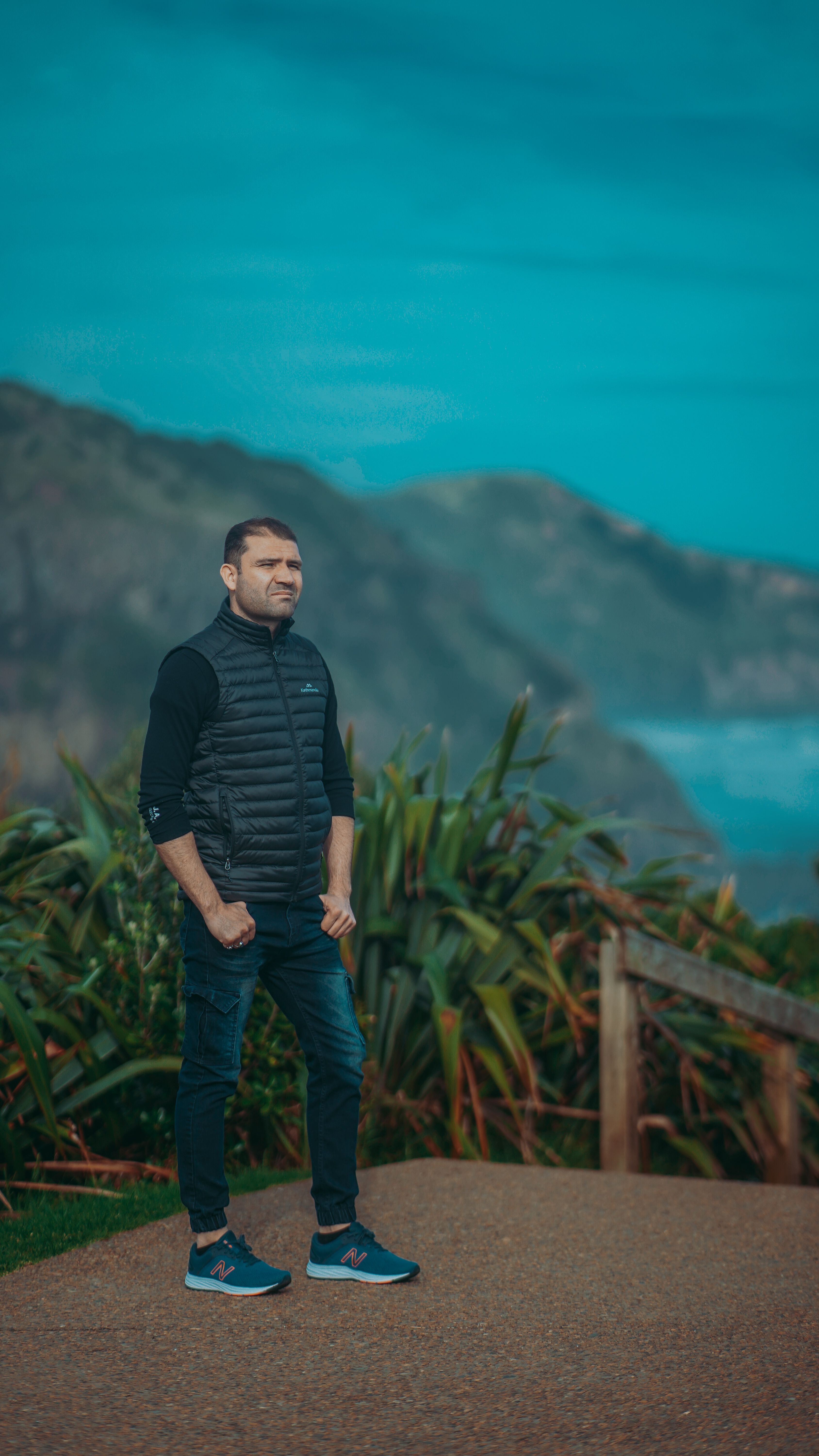 Man Standing on Paved Pathway · Free Stock Photo