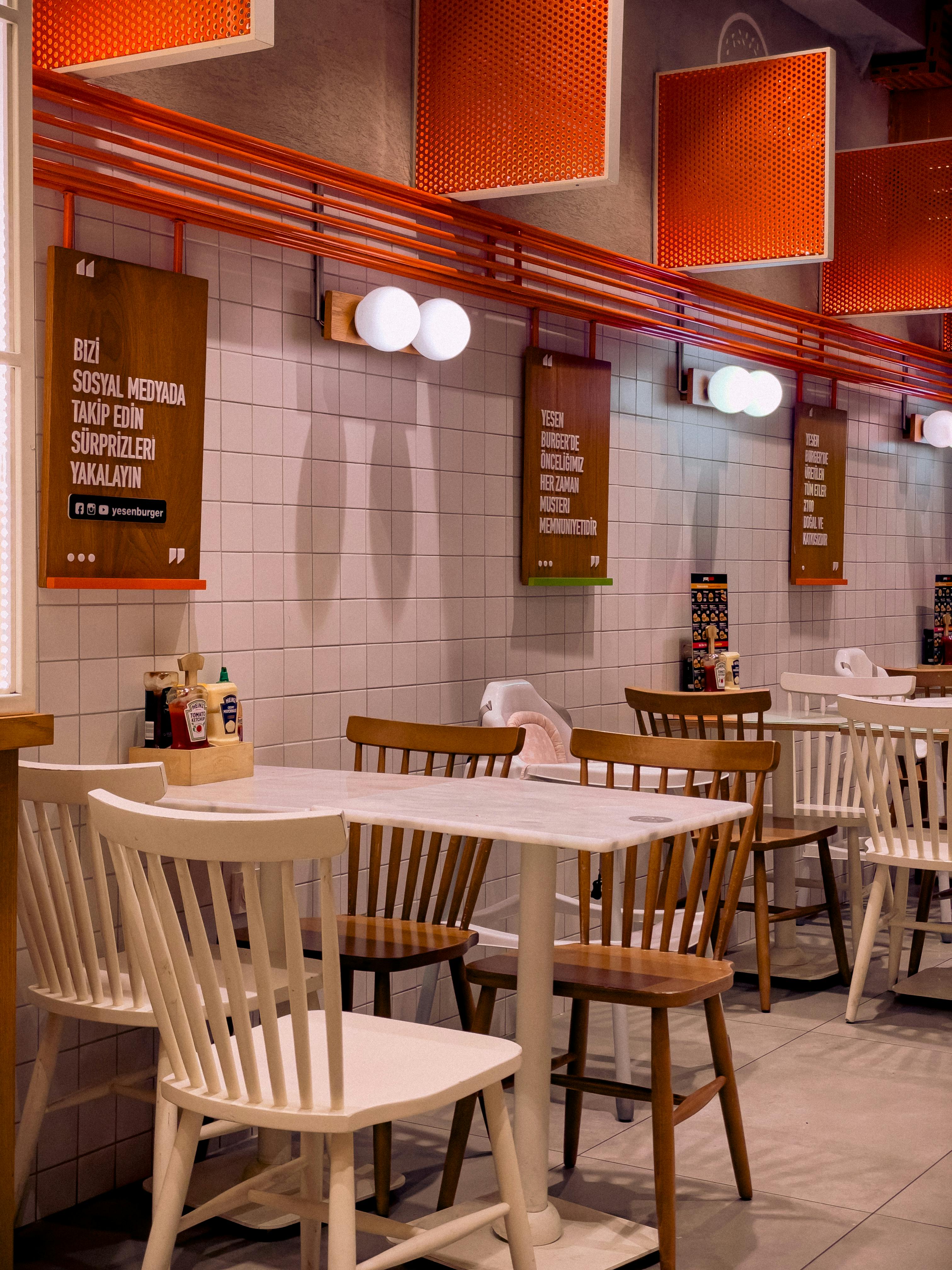 Chairs and Tables in Restaurant Interior · Free Stock Photo