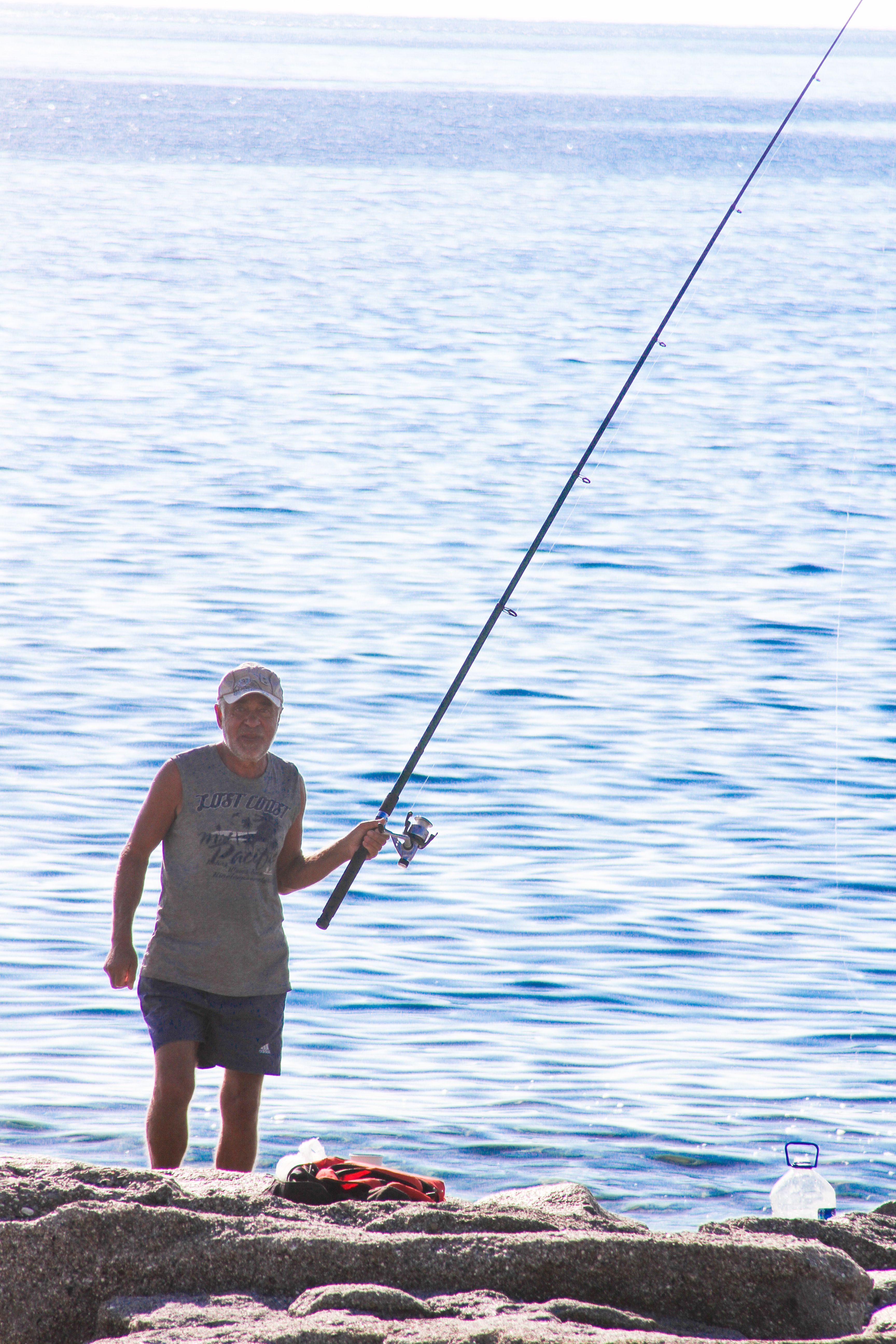 Women Wearing Rubber Boots Holding Fishing Rods · Free Stock Photo