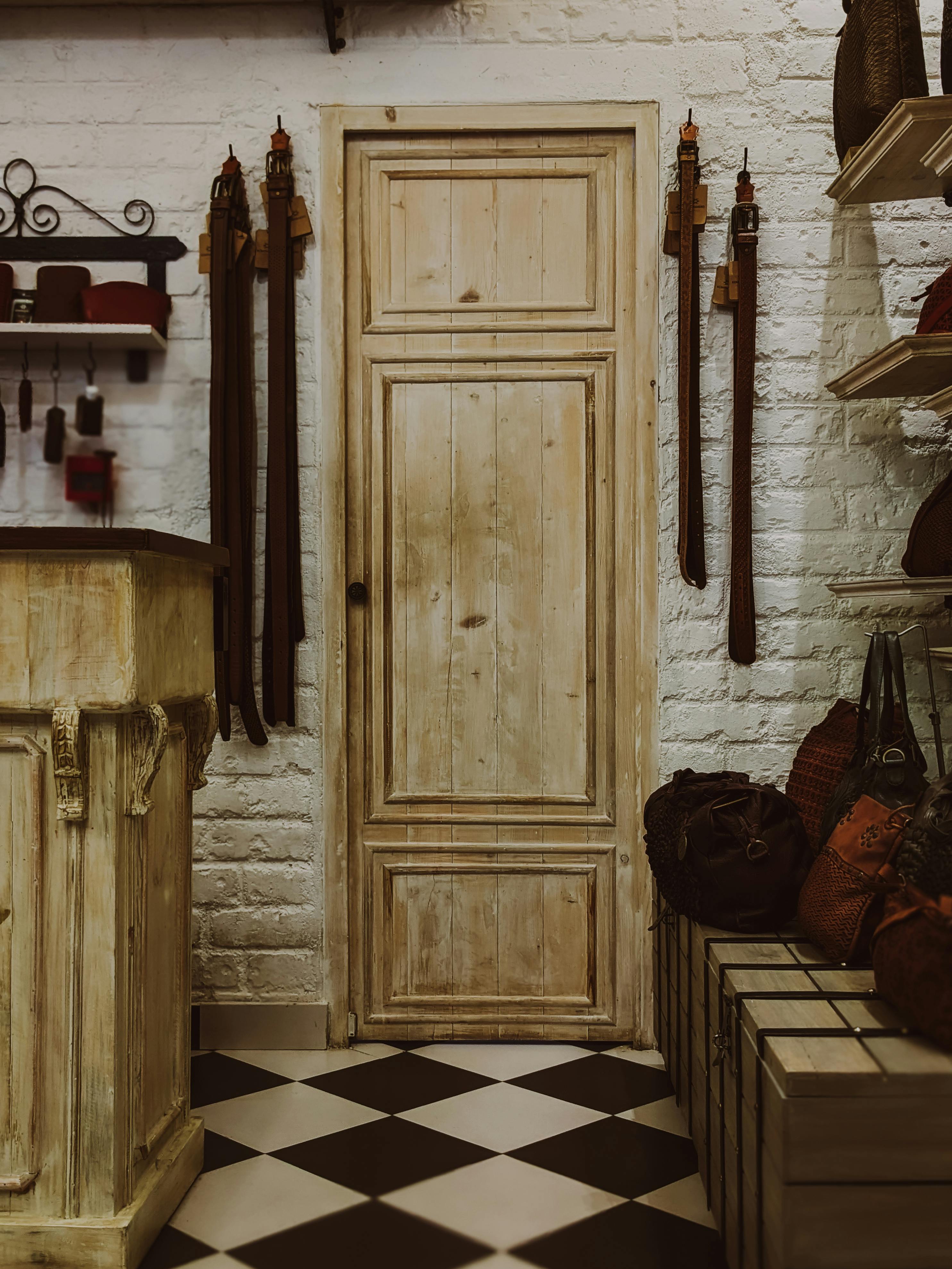 Dark Photo of a Vintage Style Shop with Alcohol · Free Stock Photo