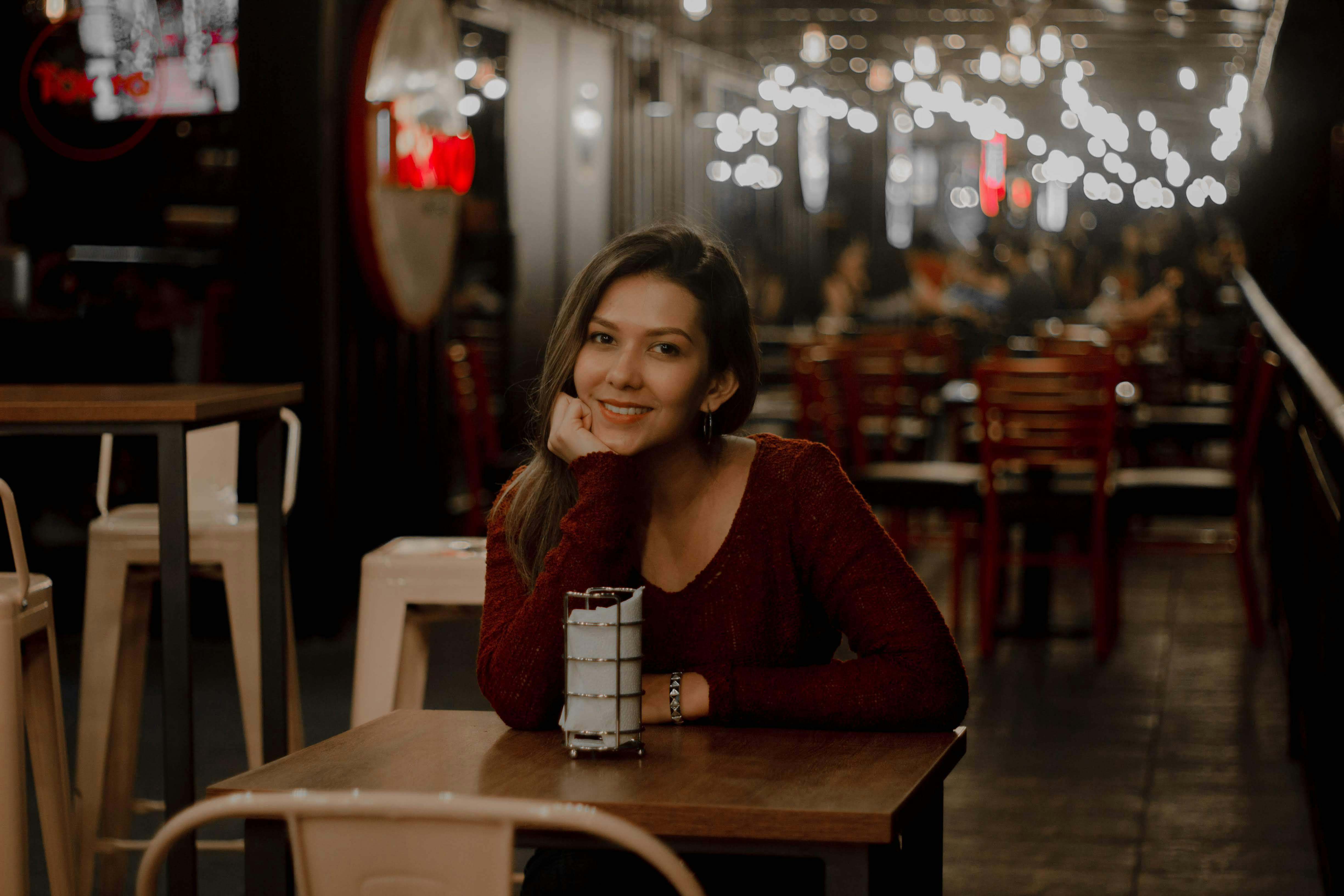 Beautiful Woman Inside a Cafe Bar · Free Stock Photo