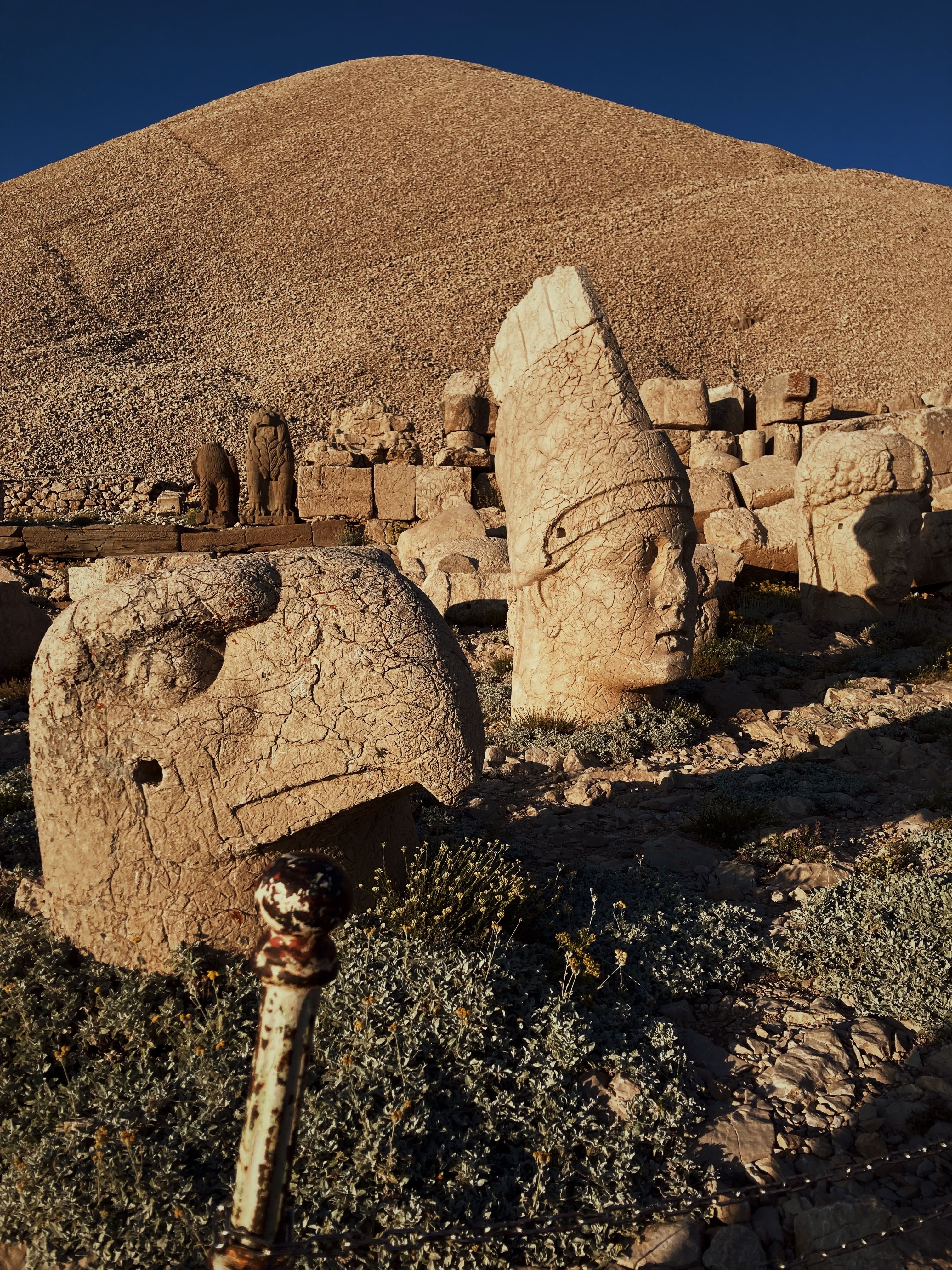 Artifacts Beside a Mountain · Free Stock Photo