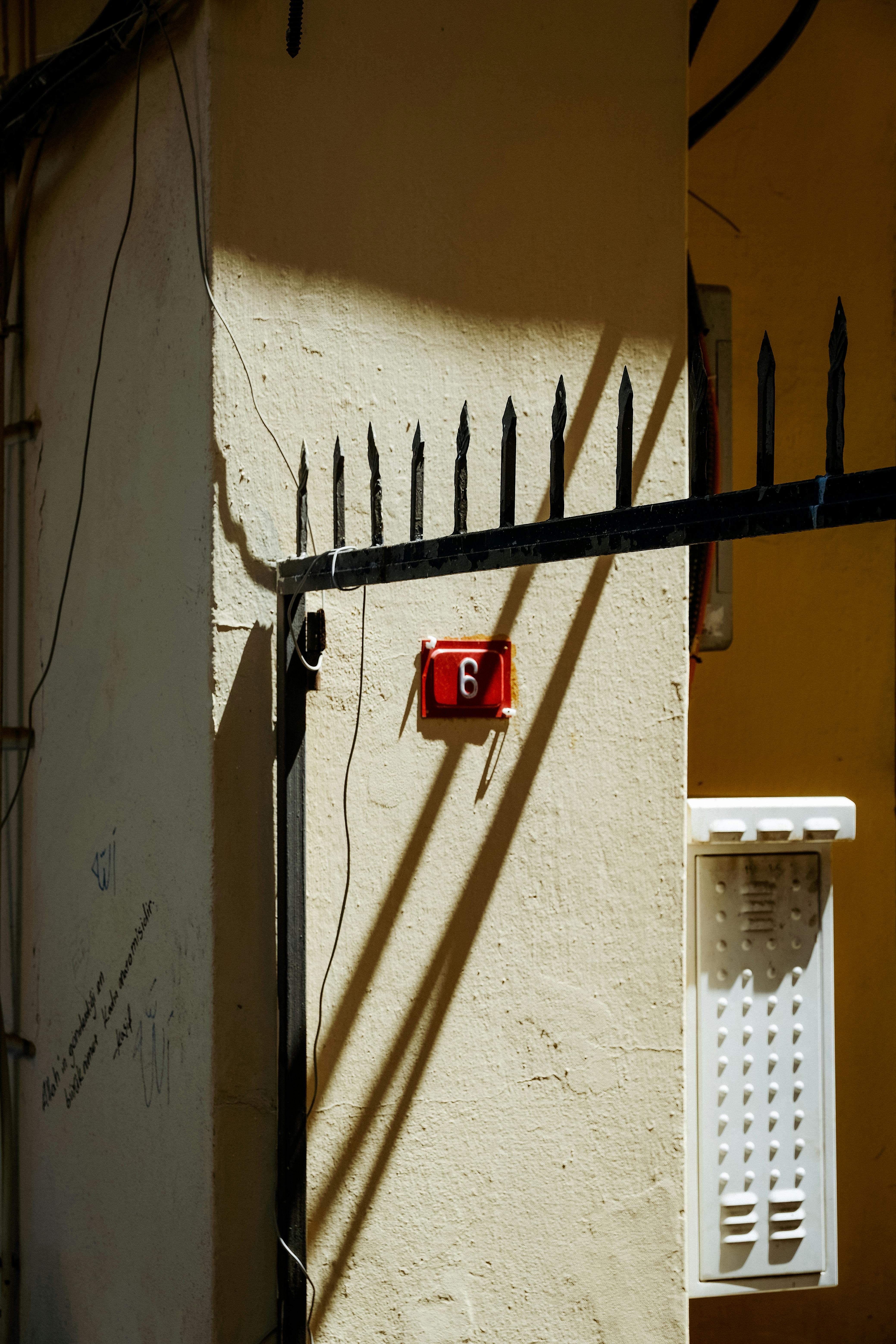 House Number Plate on a Wall · Free Stock Photo