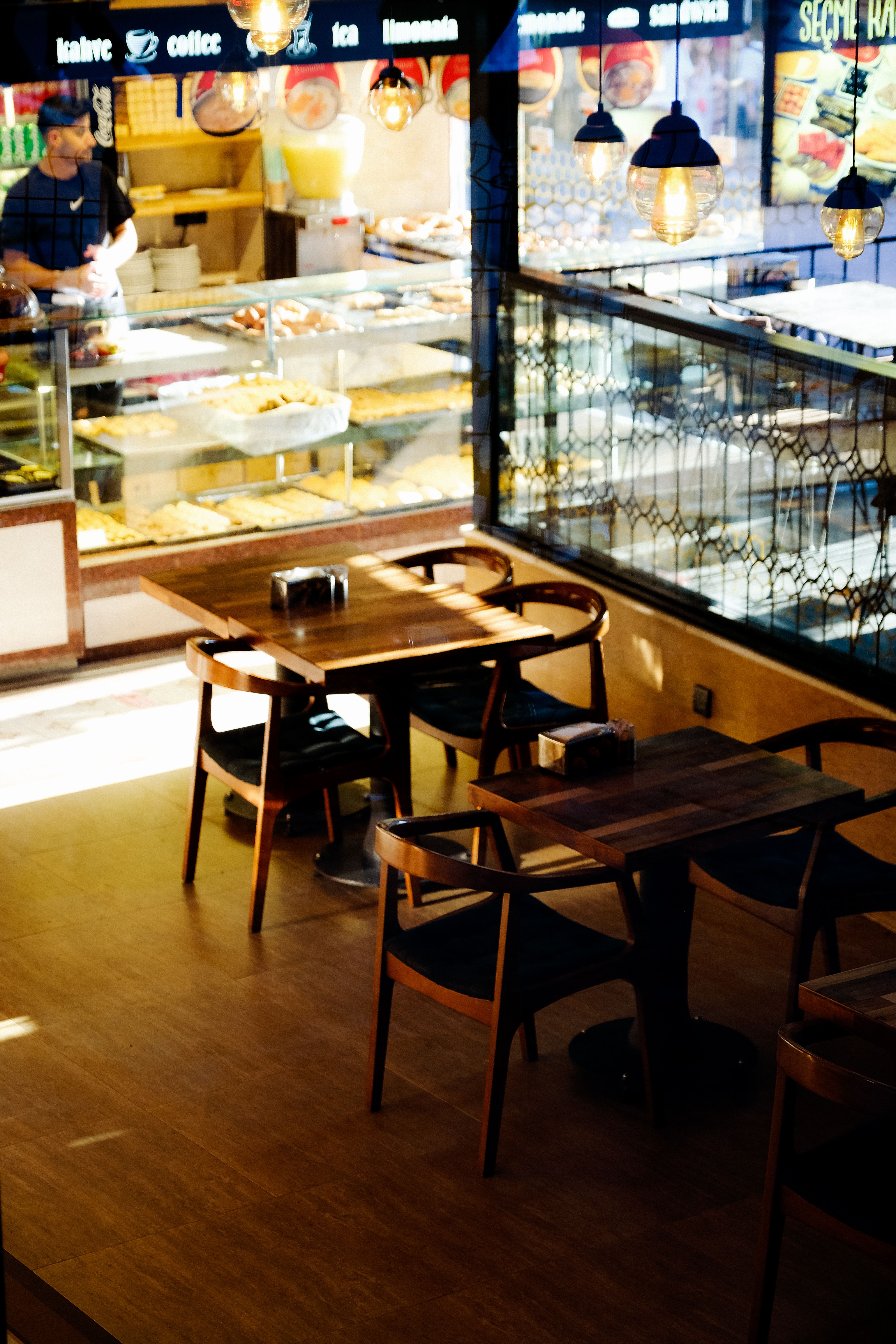 Photo of a Restaurant Interior with Sits, Tables and Bar Counter · Free ...