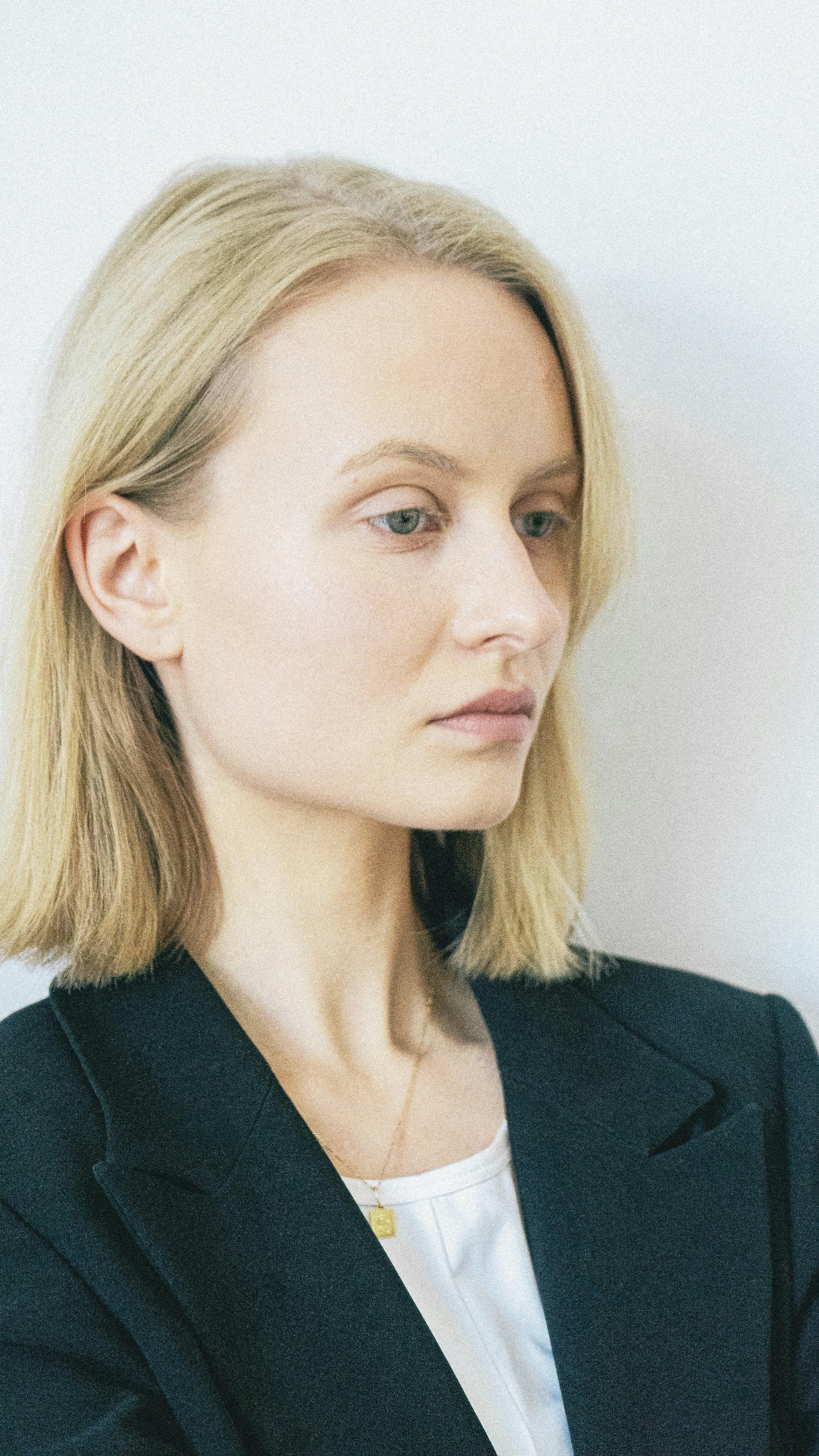 Portrait of Elegant Woman with Neutral Expression · Free Stock Photo