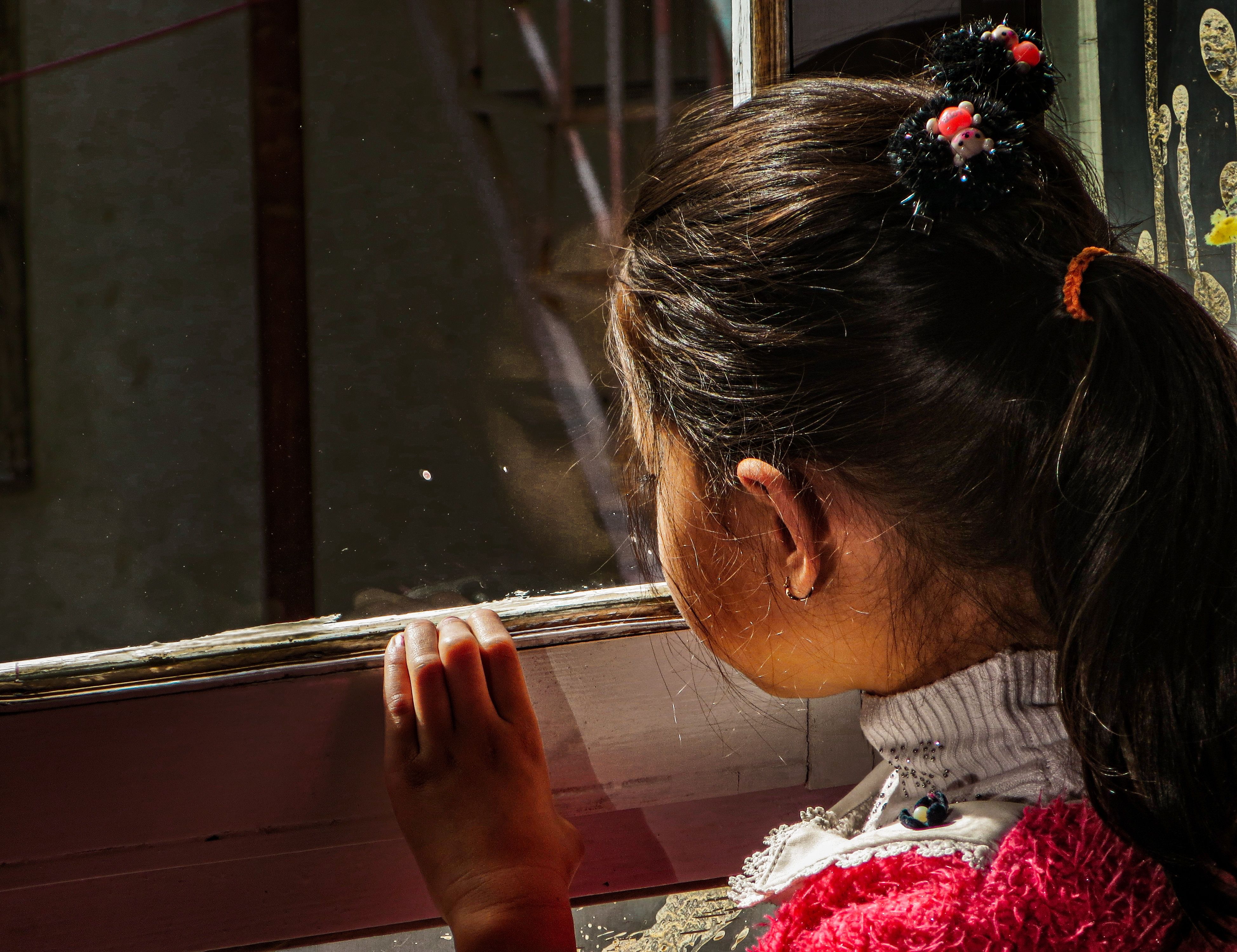 Children Standing in Front of the Glass Window · Free Stock Photo
