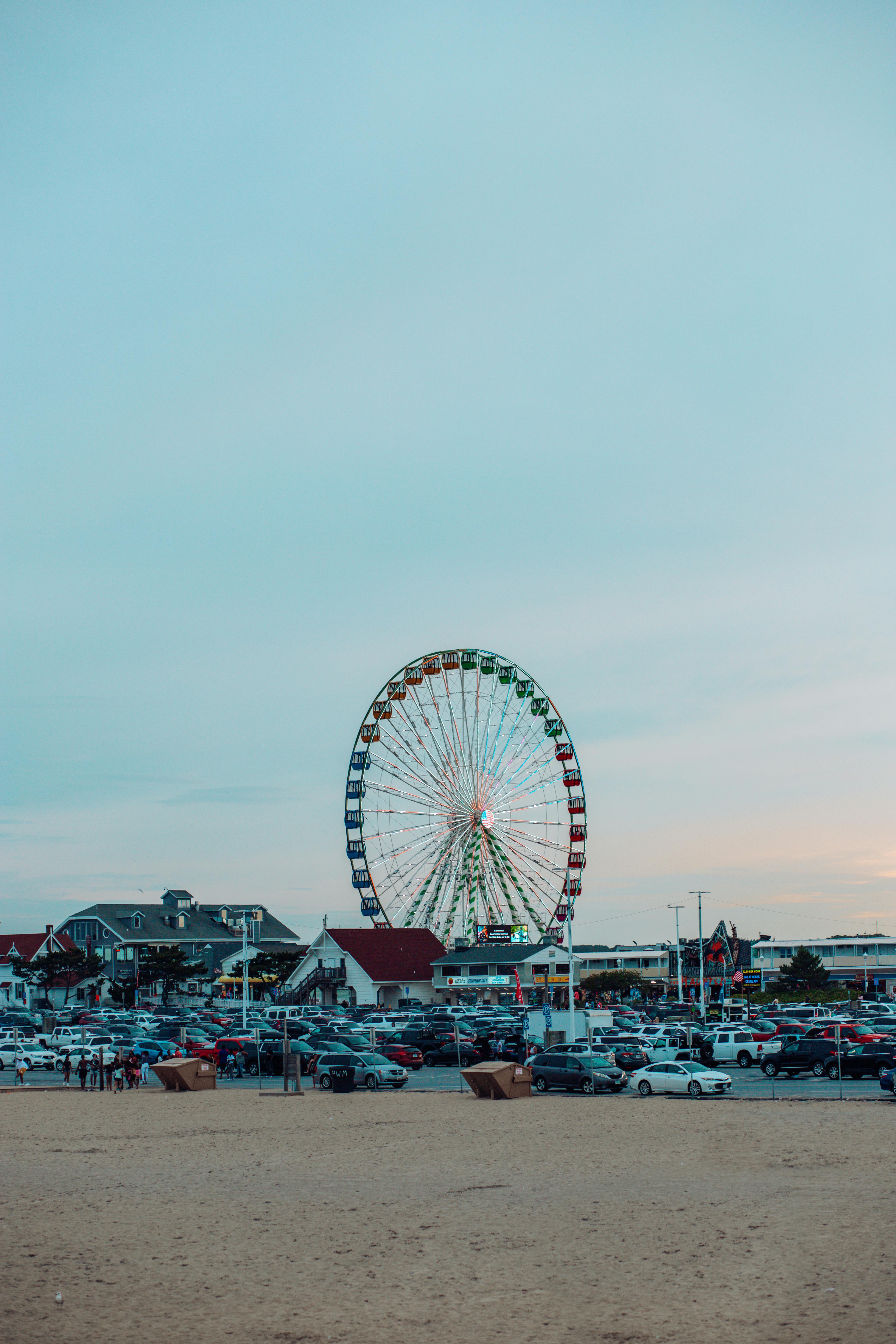Distant View of Fairground at Sunset · Free Stock Photo