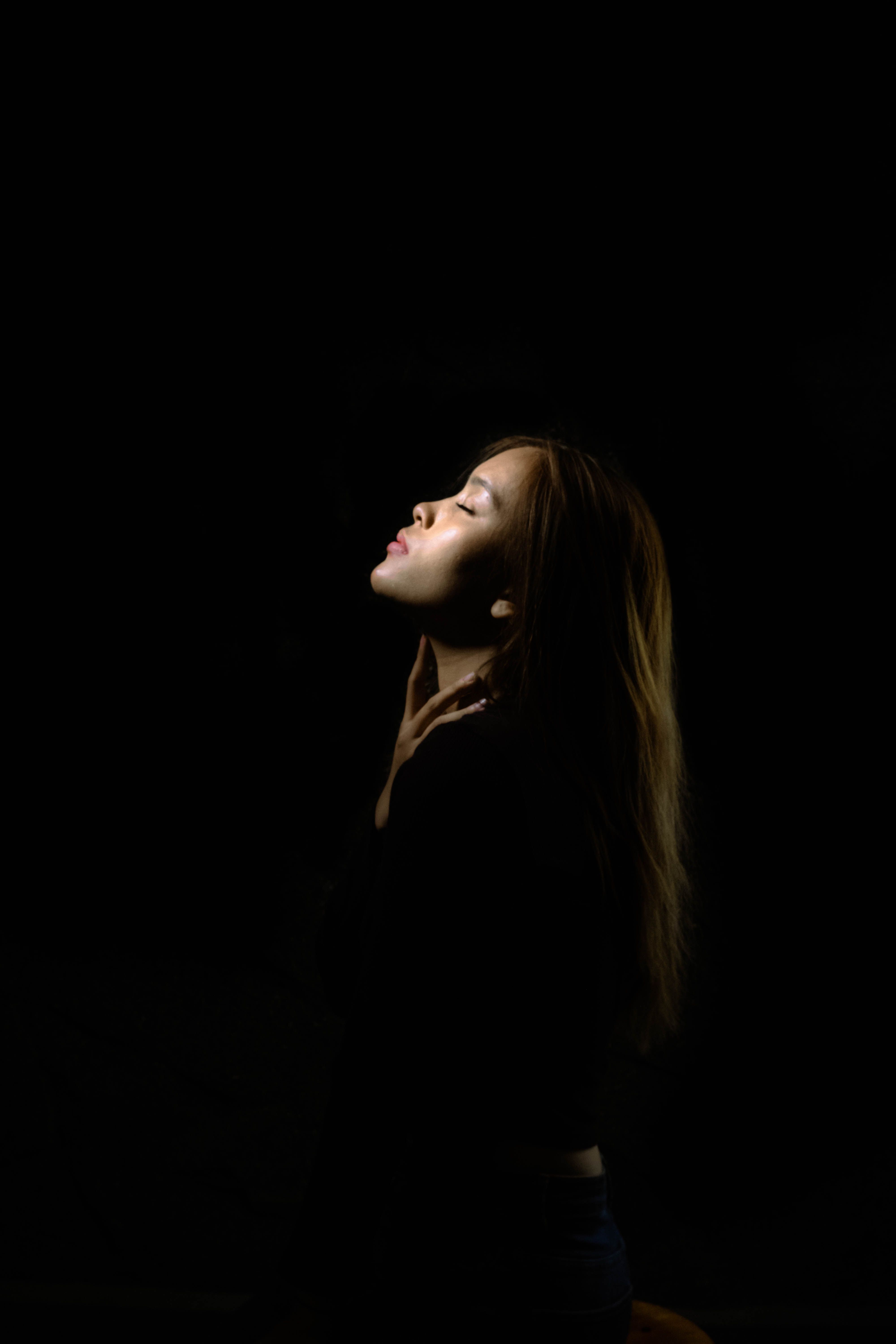 Side View of a Woman Taking a Shower · Free Stock Photo
