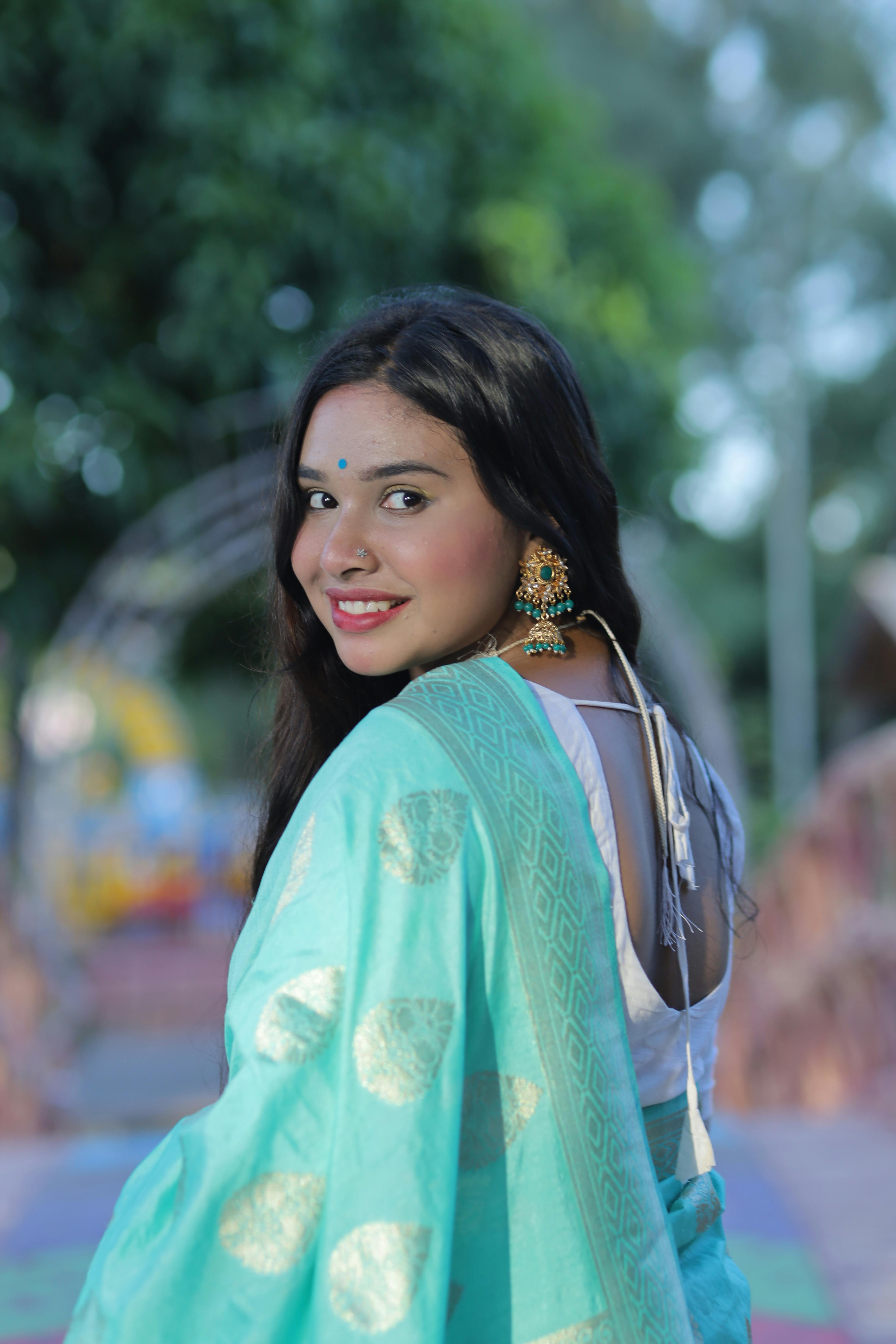 Portrait of Woman Wearing Turquoise Sari · Free Stock Photo