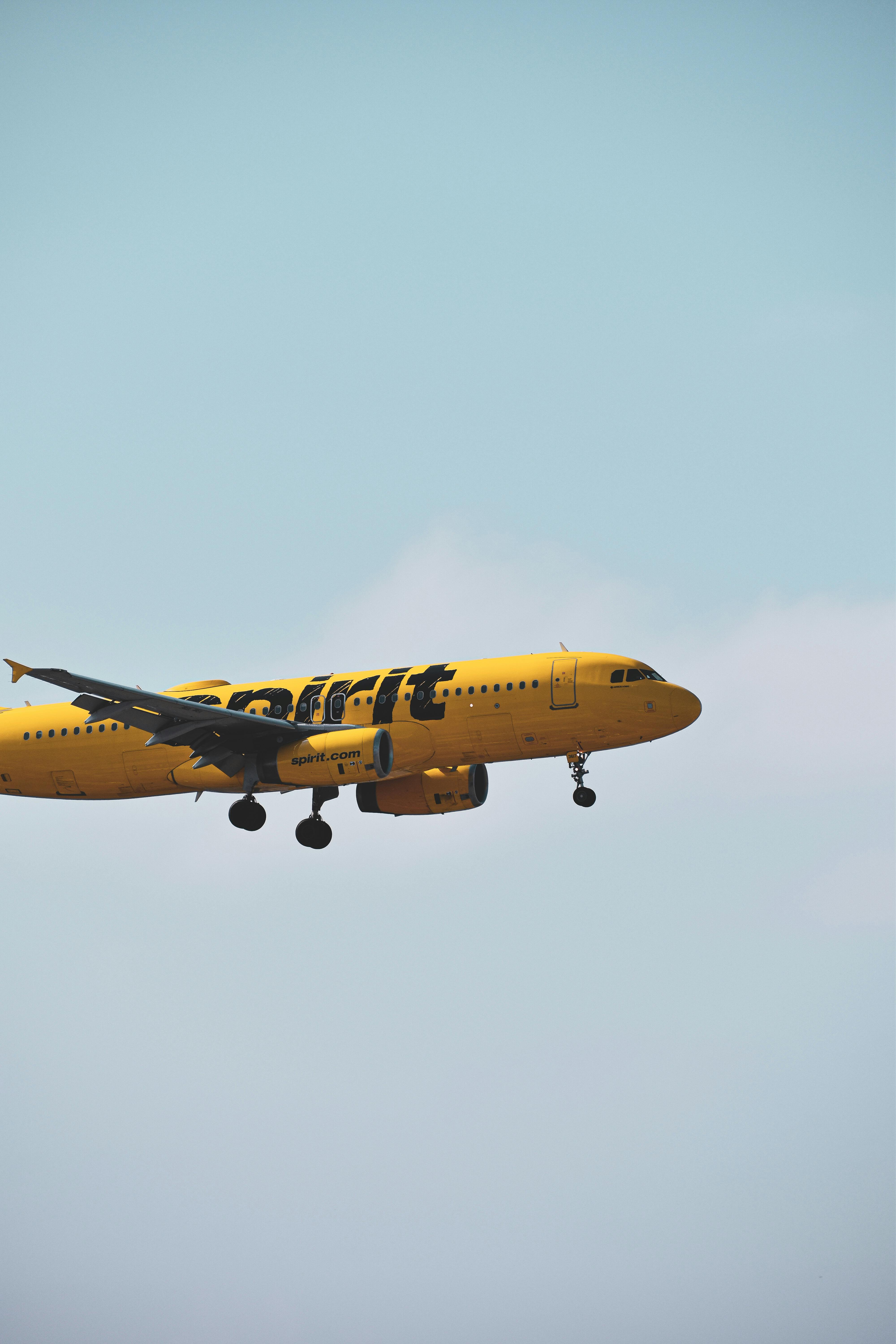 Yellow Airplane Flying · Free Stock Photo