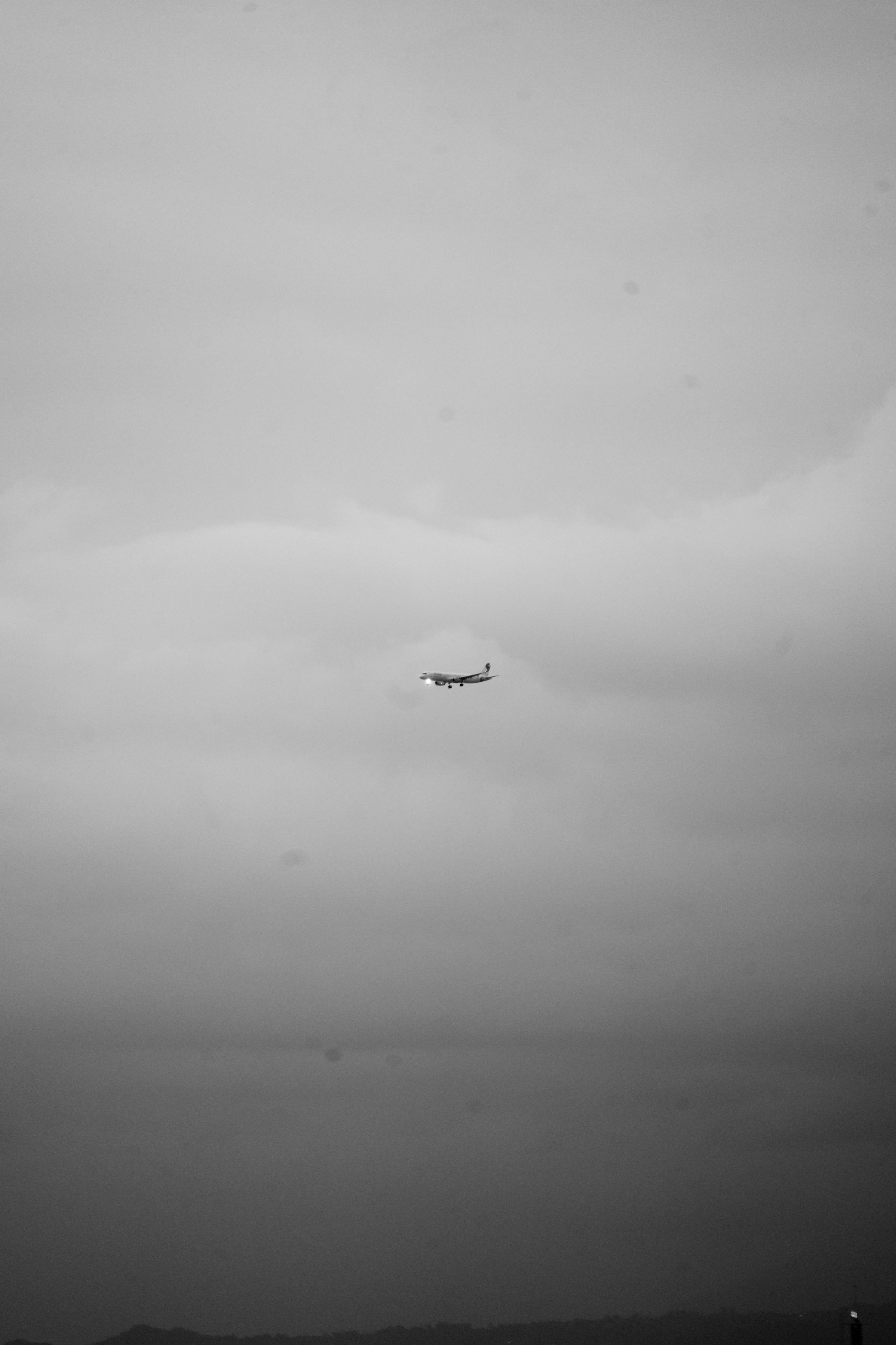 Photography Grayscale of Performing Jet · Free Stock Photo