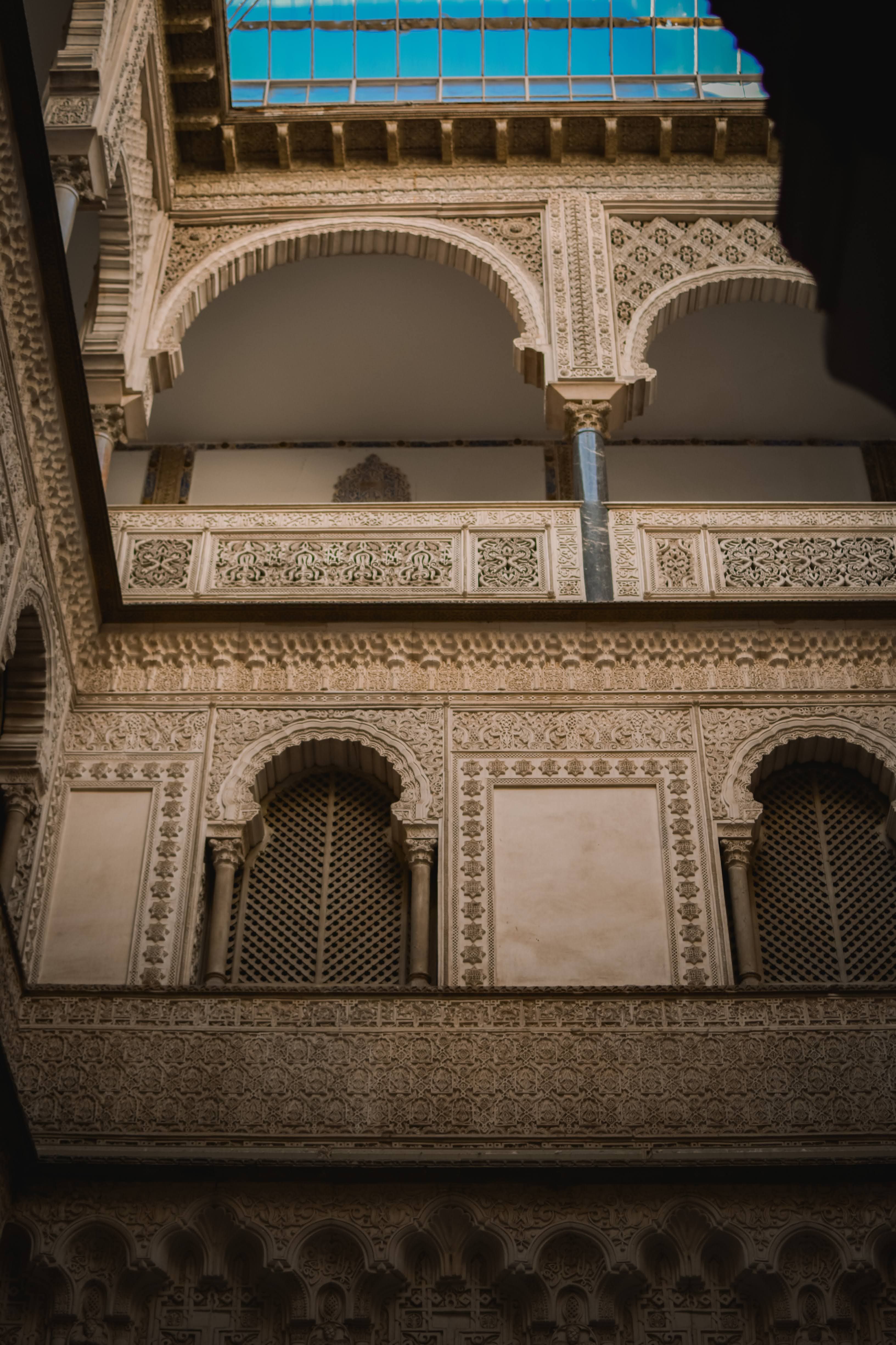 Arches and Balcony on Building · Free Stock Photo