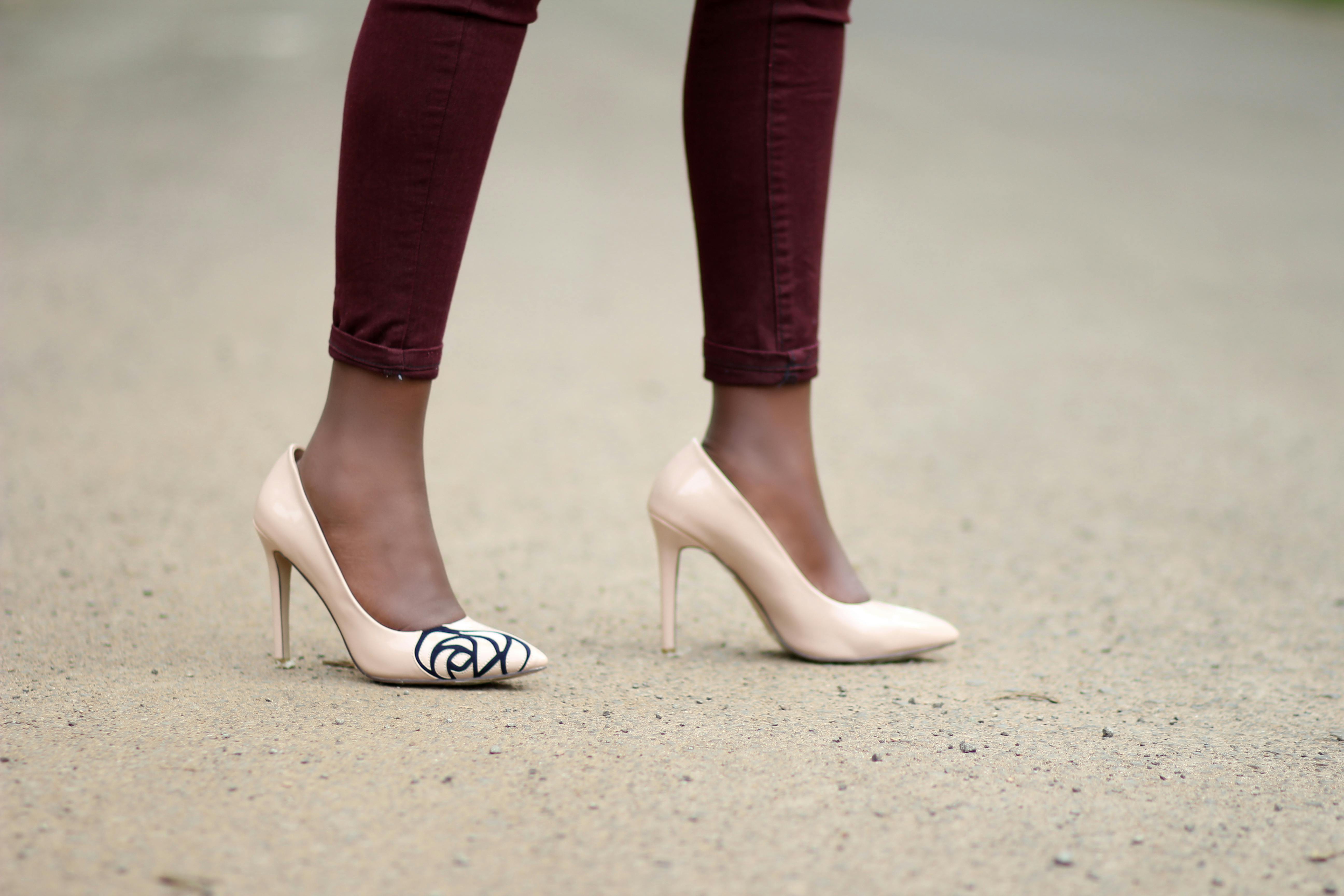 Woman in High Heels on Bed · Free Stock Photo