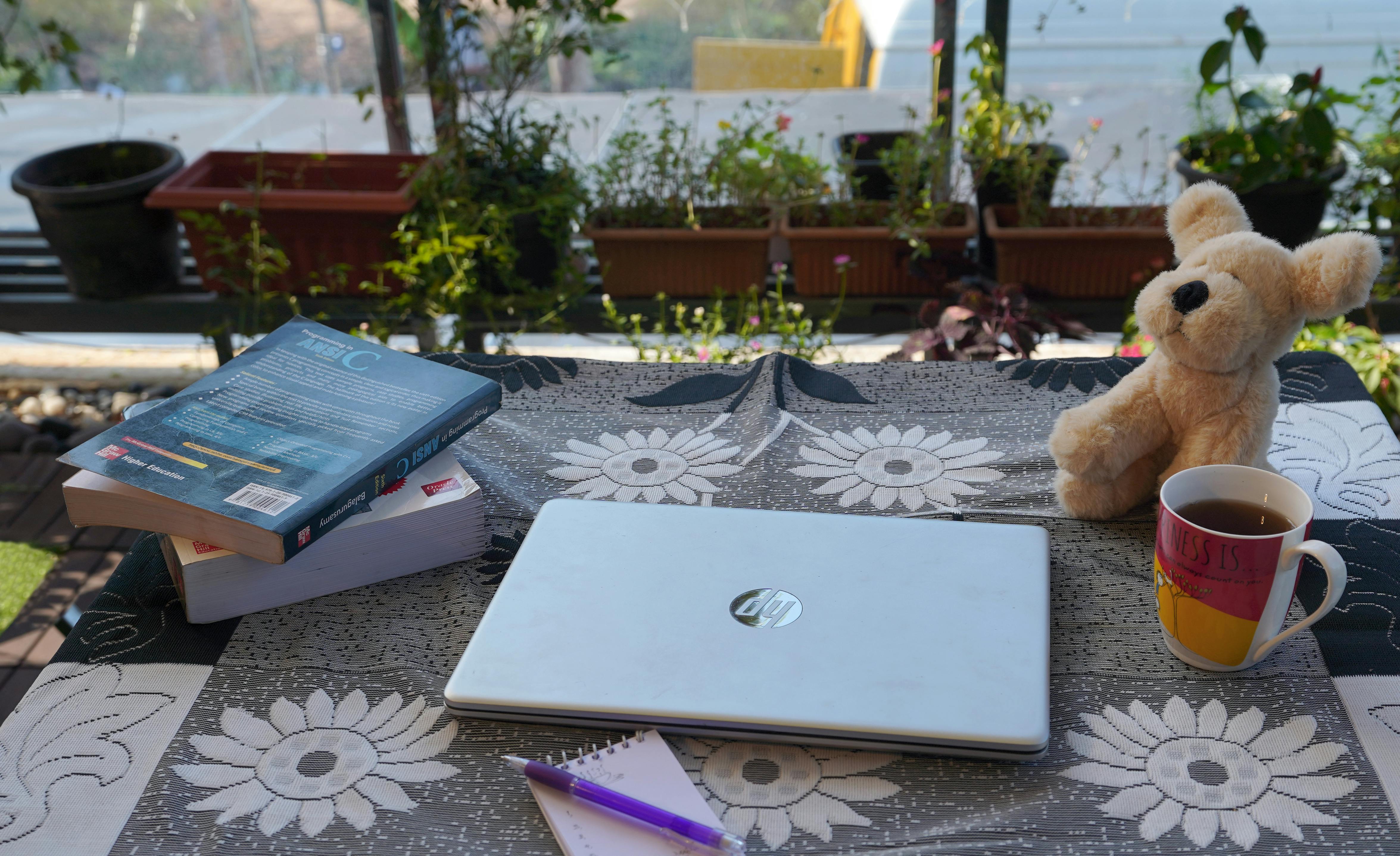 Pink Panther Plush Toy on Brown Bench Miniature · Free Stock Photo