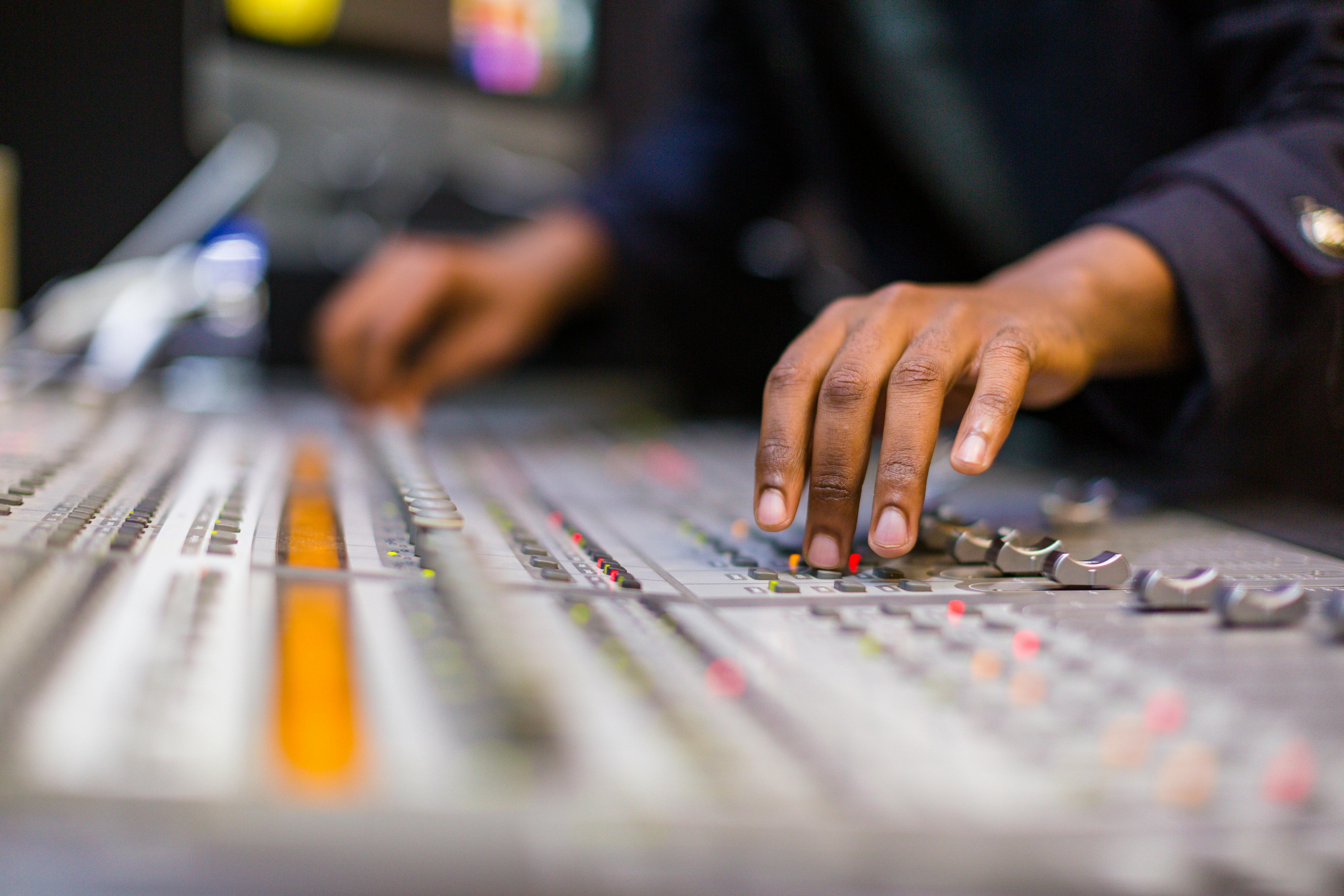 Hand on Sound Mixer · Free Stock Photo